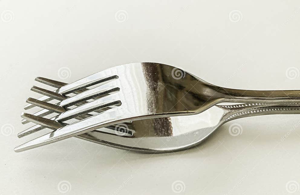 Abstract of 2 Forks in Love Stock Photo - Image of abstract, reflection ...