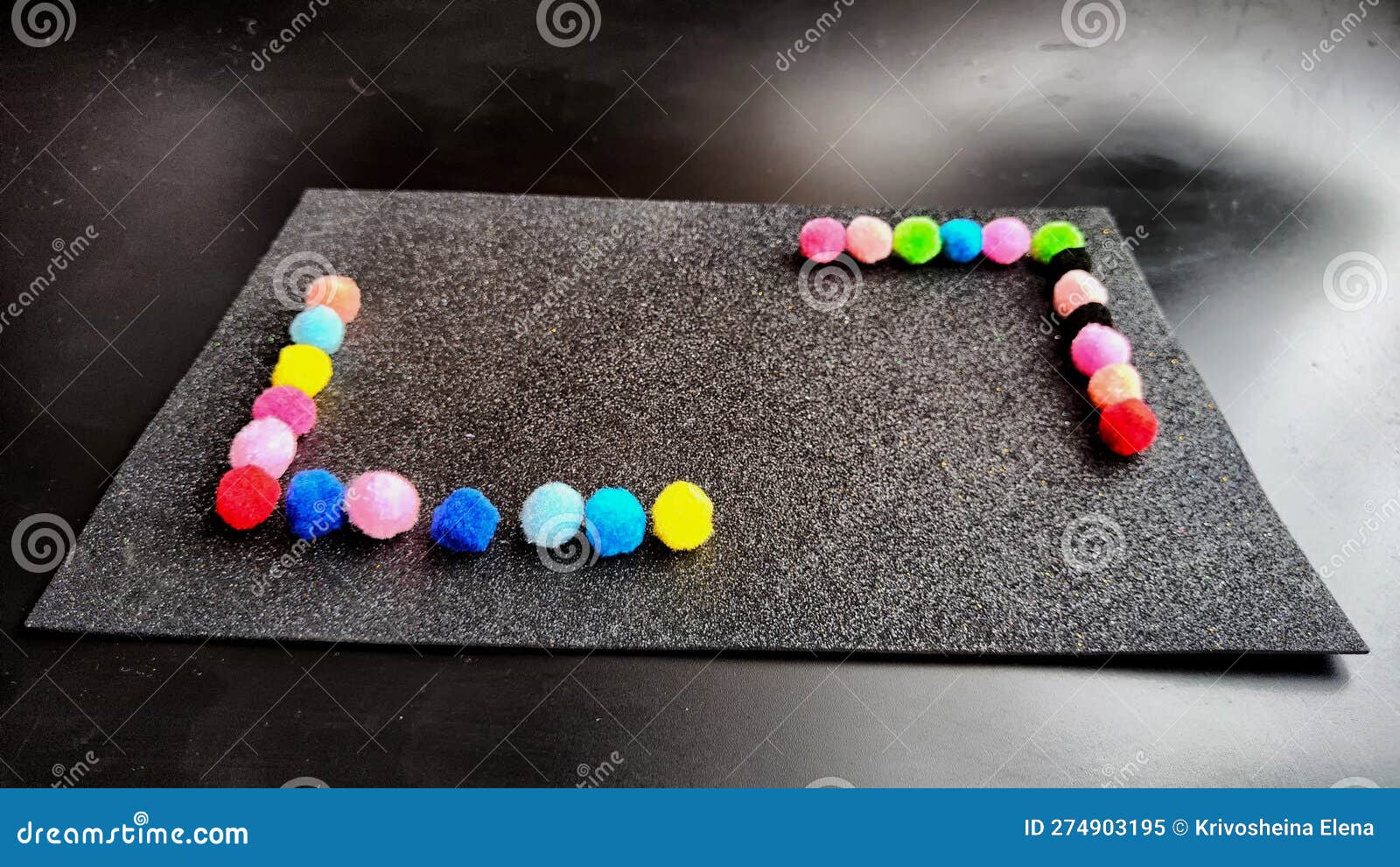 Abstract Frame with a Black Velvet Rectangle and Multicolored Balls ...