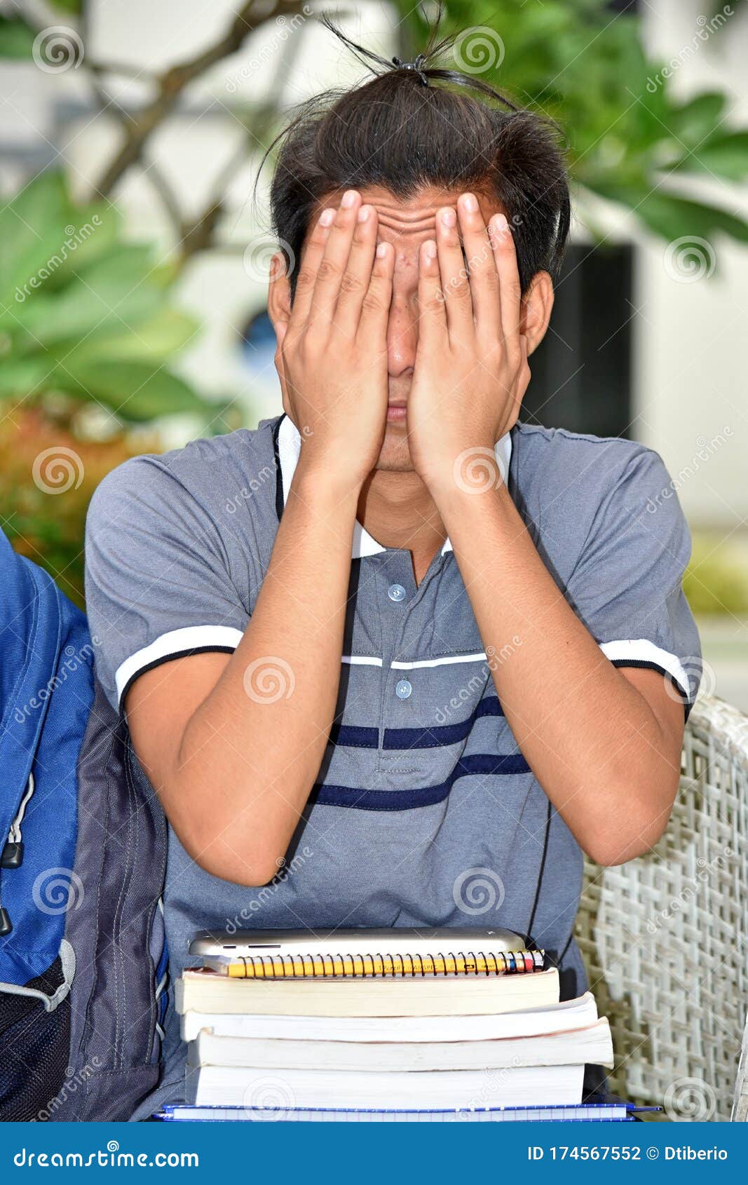 Ashamed Filipino Boy Student with Notebooks Stock Photo - Image of ...
