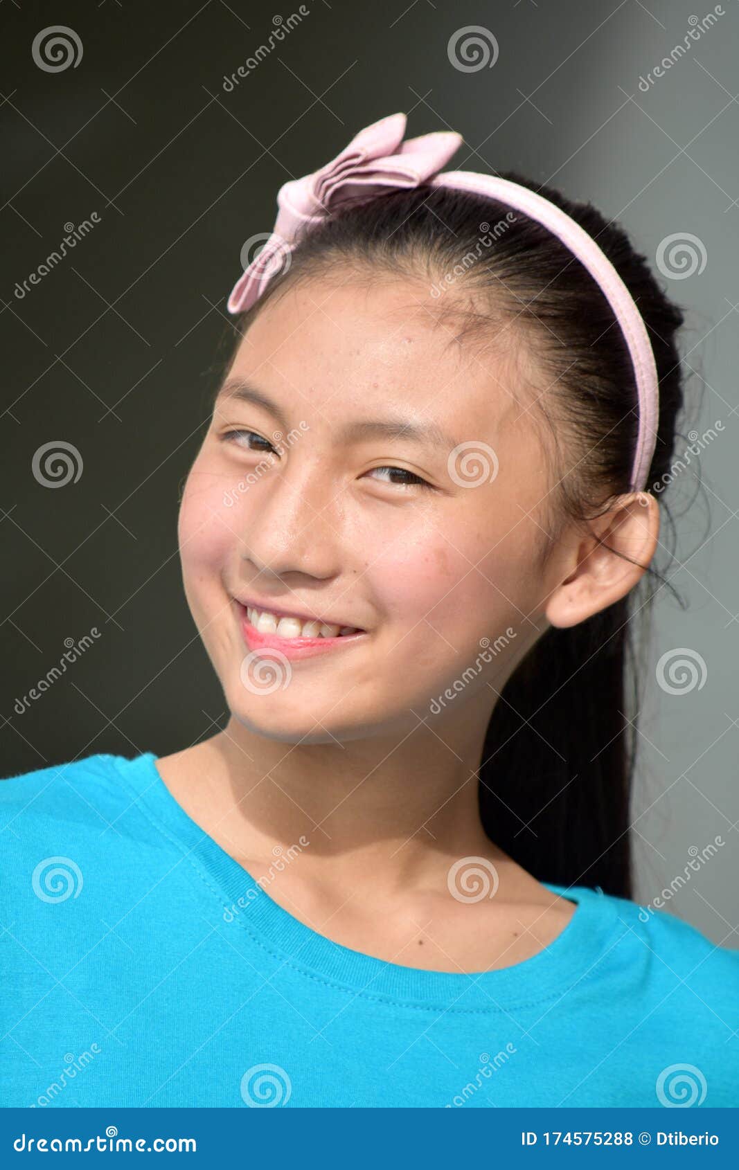 A Cute Female Smiling stock photo. Image of smile, adorable - 174575288