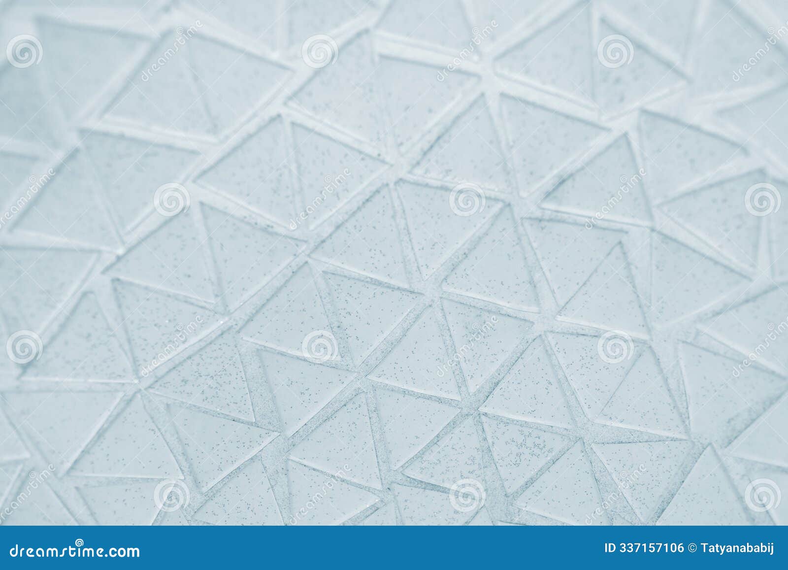 Abstract Geometric Pattern of Light Blue or Grey Triangles with Glass ...