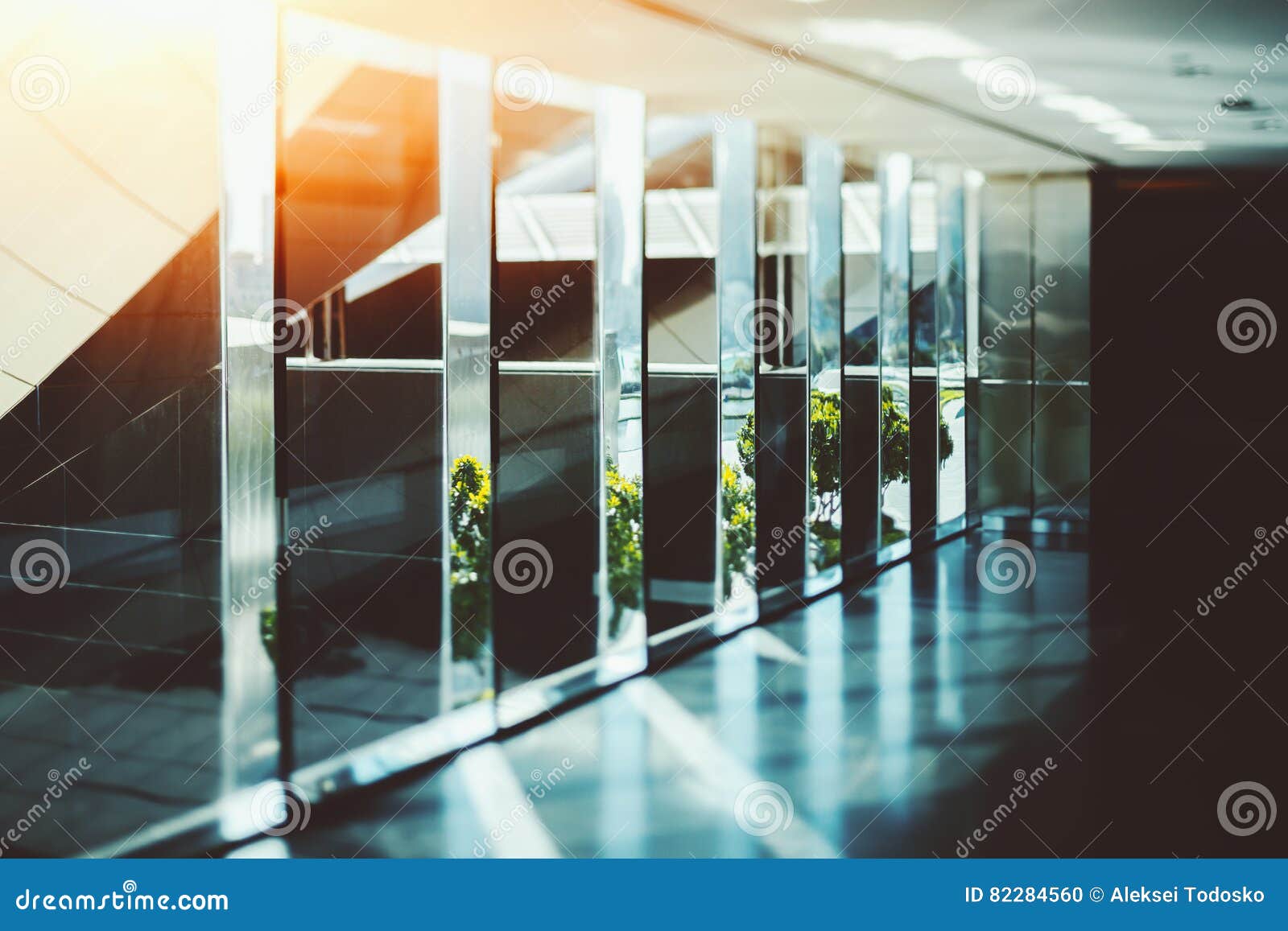 Abstract Glass and Chrome Office Interior Background with Sun Ra Stock ...