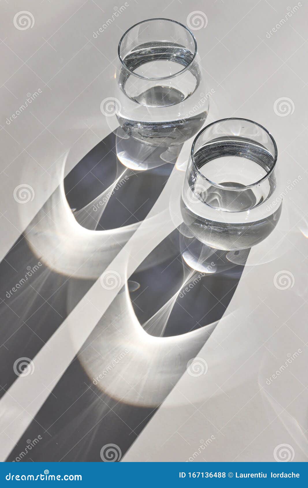 Glass of Still Water and Shadow Stock Photo - Image of shadow, quality ...