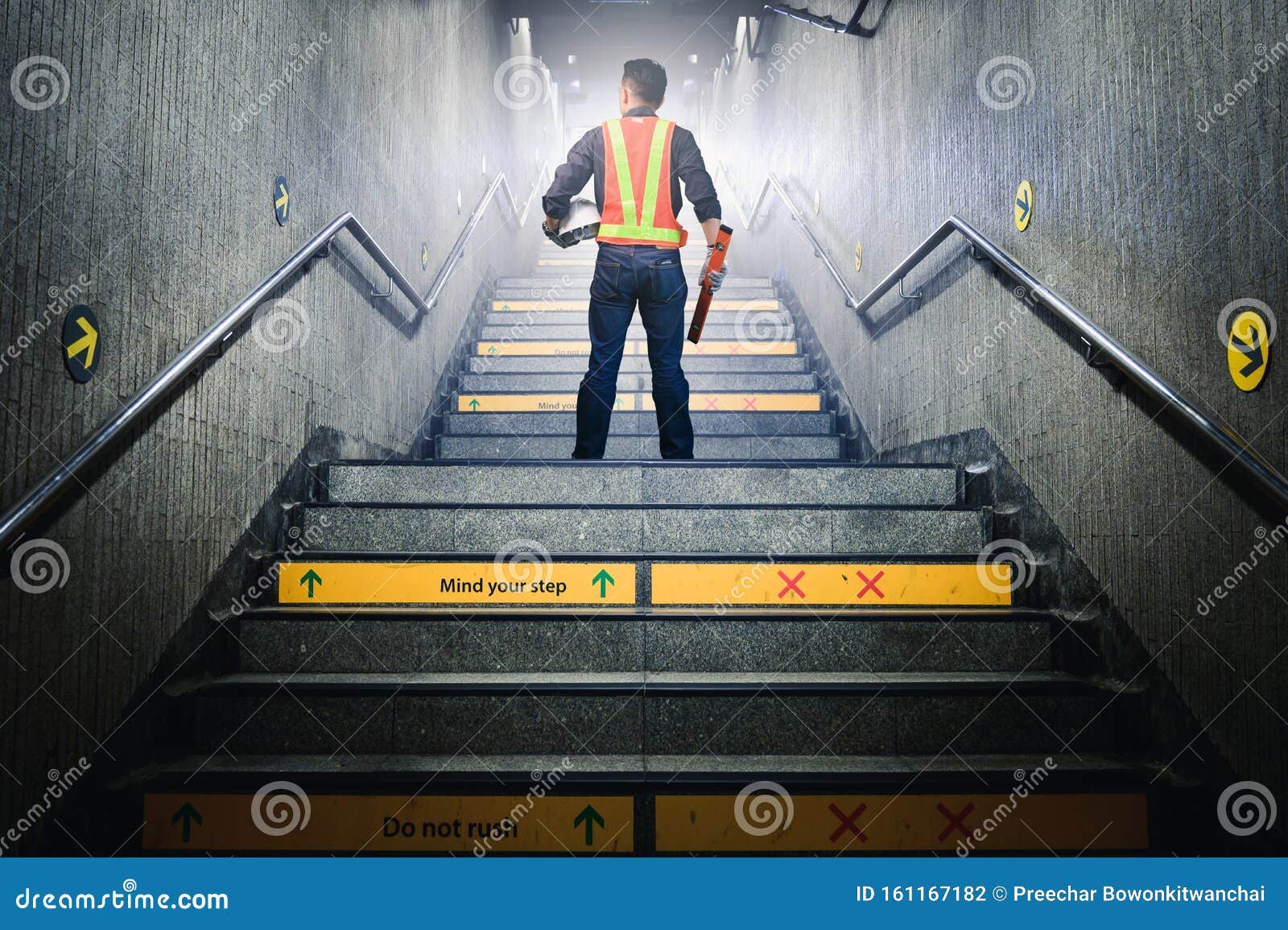 The Abstract Image of the Engineer Walk Up the Stairs. the Concept of ...