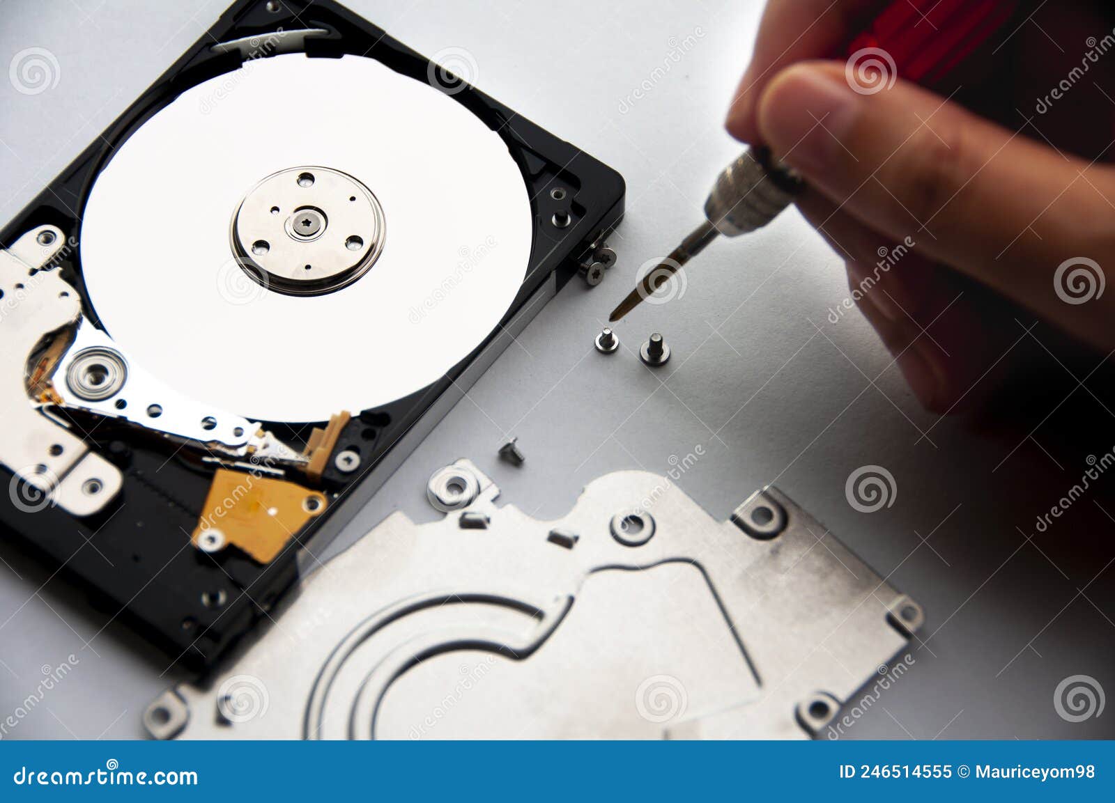 The Abstract Image of Inside of Hard Disk Drive with Technician Fixing ...