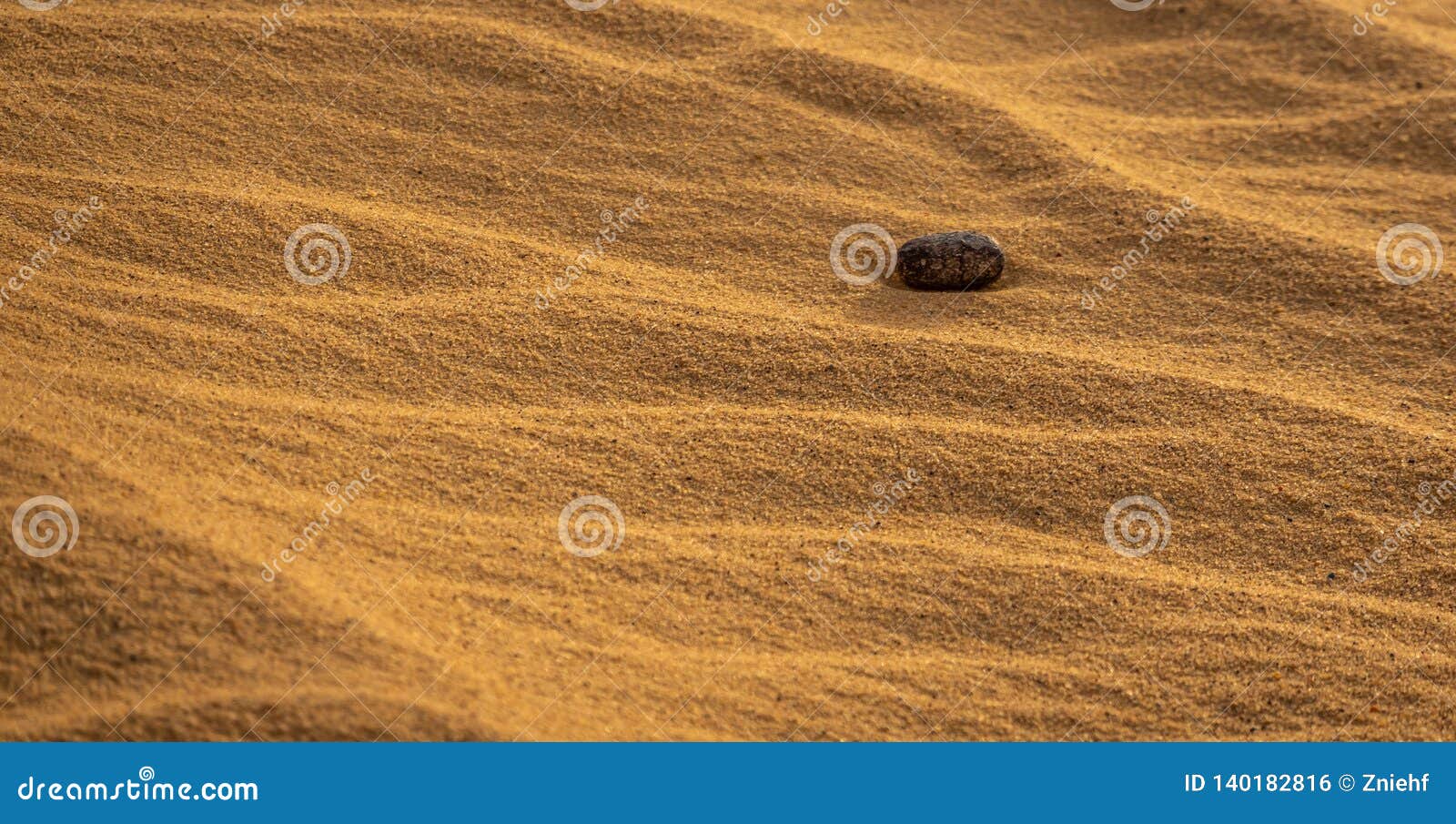 Abstract Image of a Round Stone in the Sand Desert, Which Will Soon Be ...