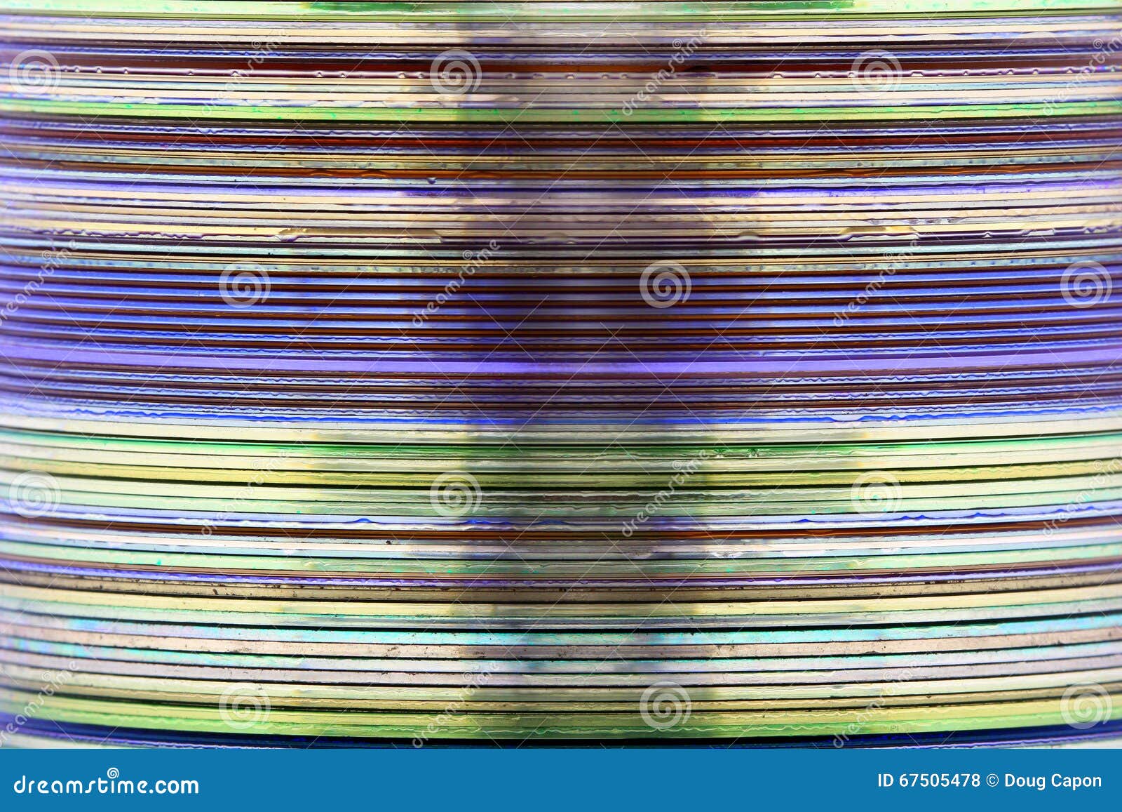 Abstract Image of a Stack of DVD and CD Media Taken from a Sideways ...