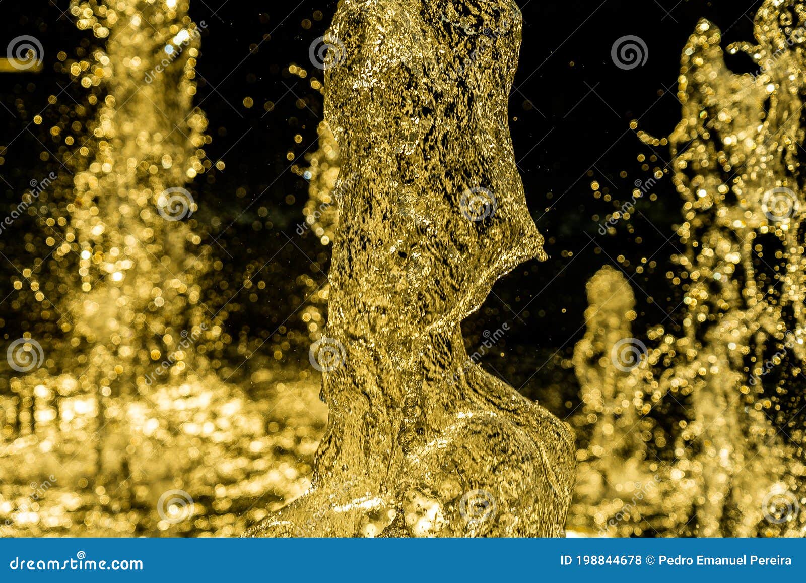 Abstract Image of a Yellow Colored Water Fountain Stock Photo - Image ...
