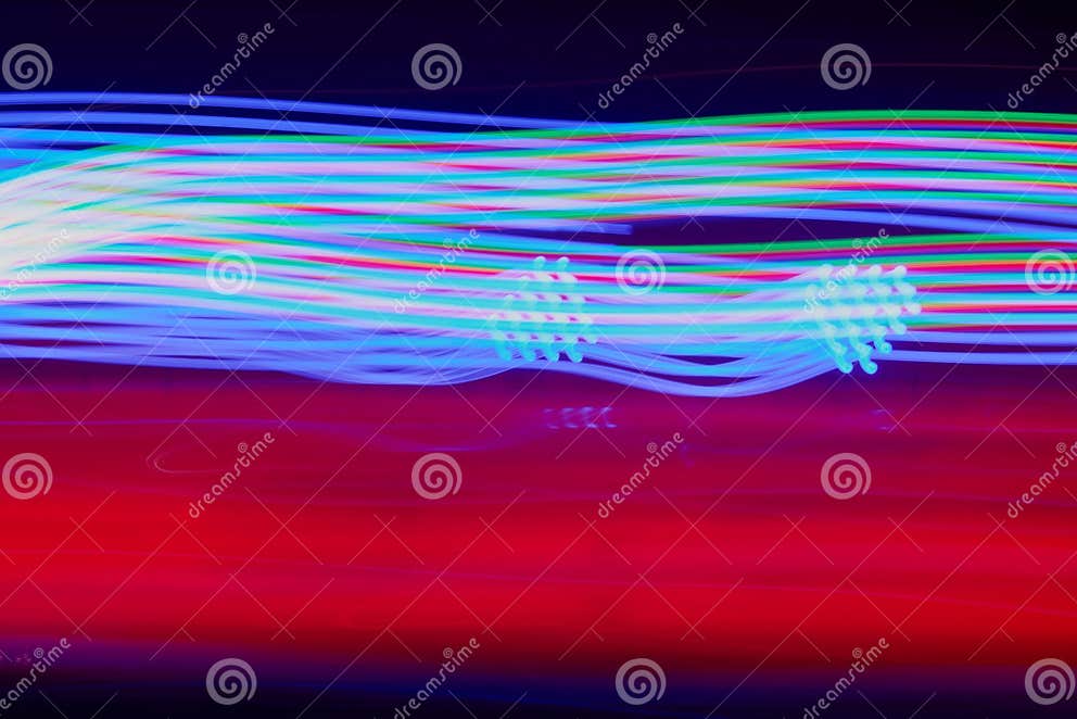 Colorful Looping Light Trails on Dark Background Stock Image - Image of ...