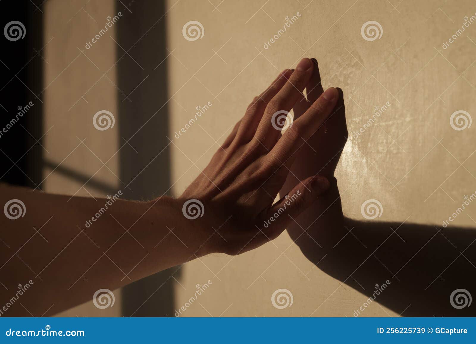 Abstract Man Hand Touch Wall with Sunset Light and Long Shadows Stock ...