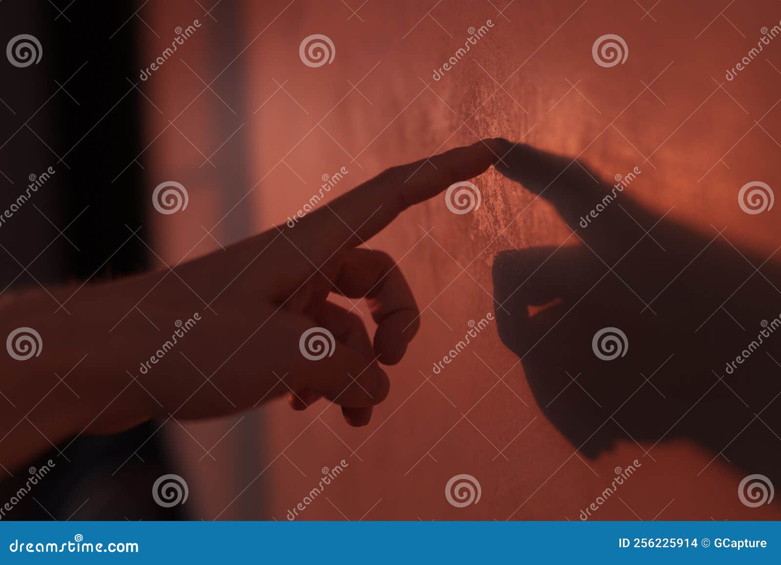 Abstract Man Hand Touch Wall with Sunset Light and Long Shadows Stock ...