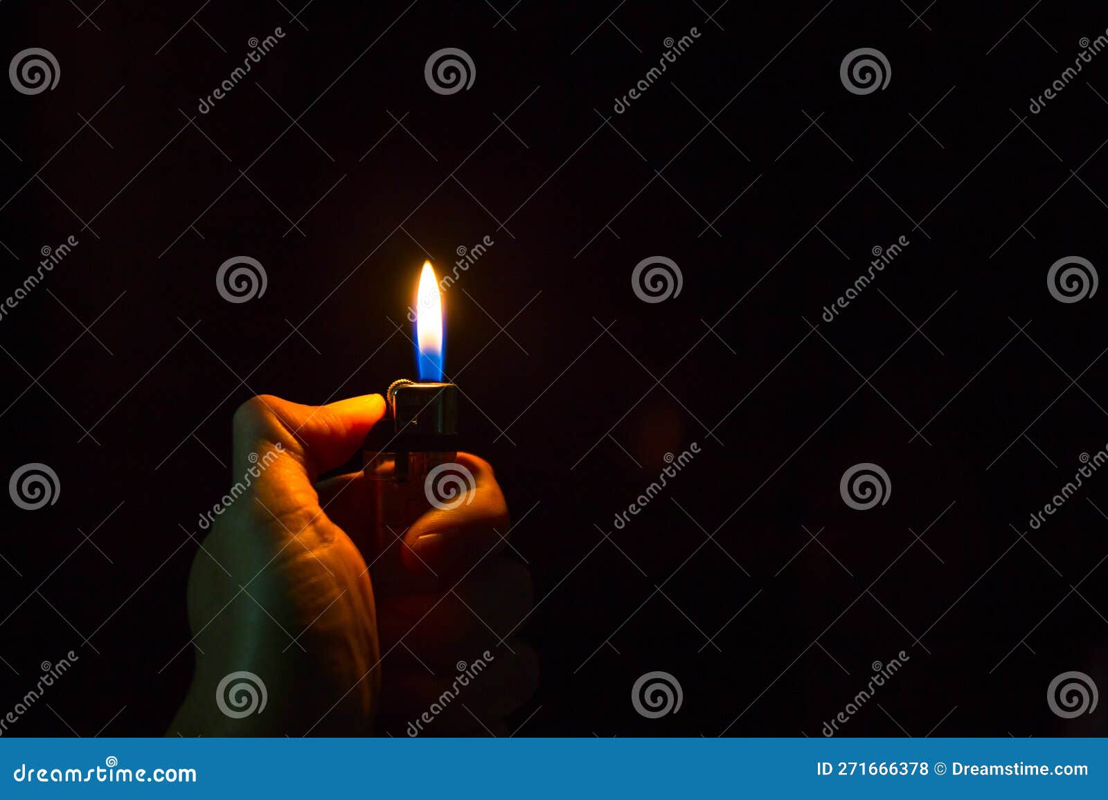Abstract Motion Hand with Lighter Igniting Sparks on Dark Background ...