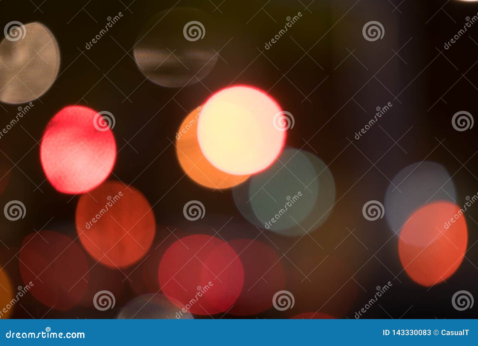Abstract Multi-colored Bokeh Balls Floating Across a Dark Background ...