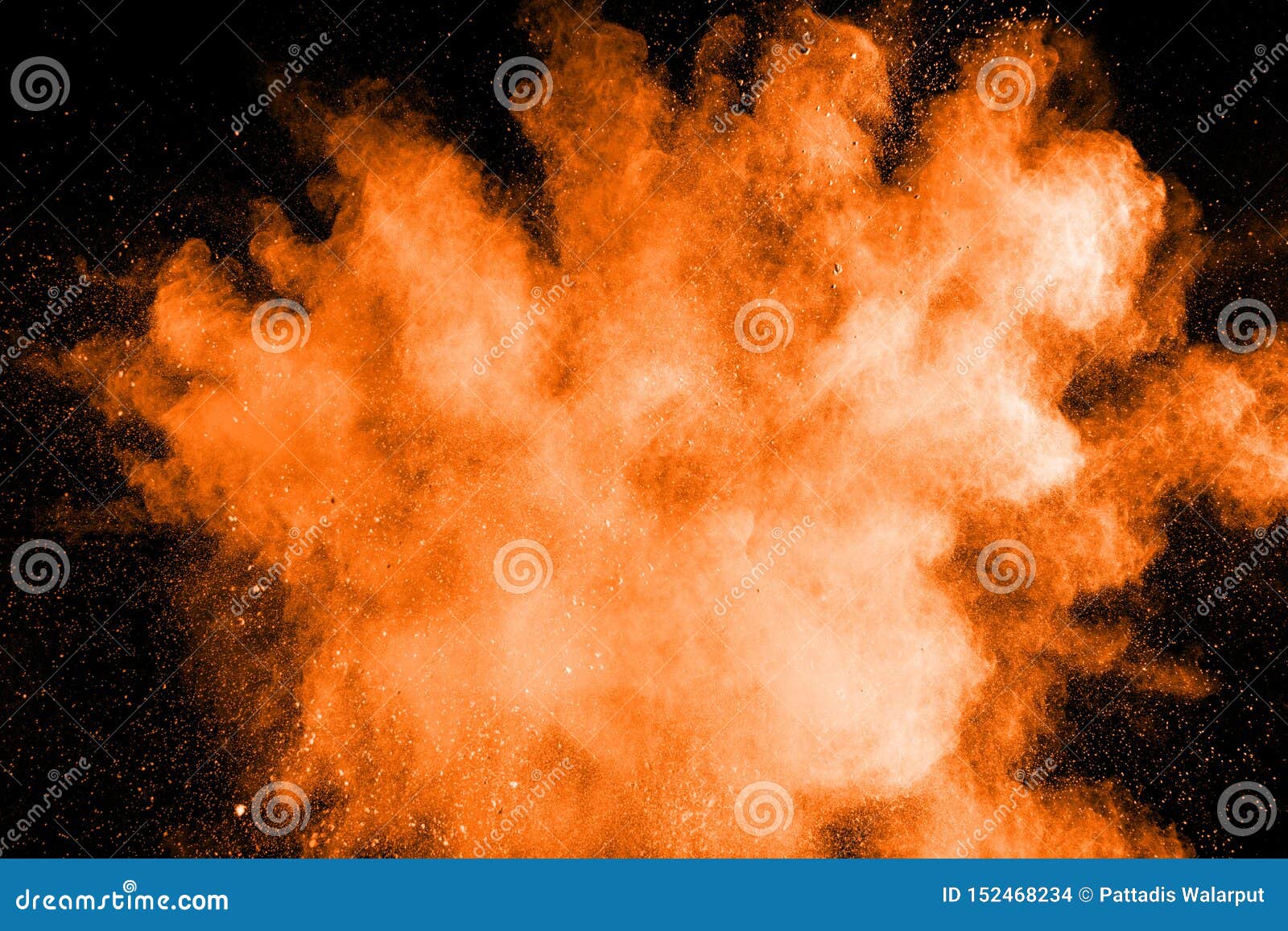 Abstract Orange Powder Explosion on Black Background.Freeze Motion of ...