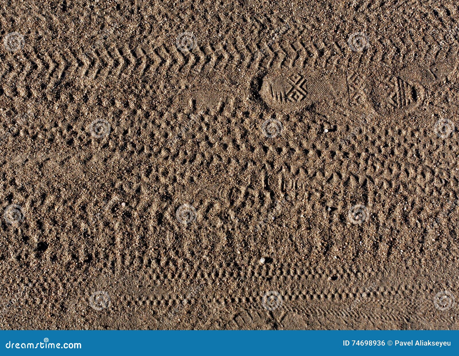 Abstract Pattern of Foot Prints and Bike Tyre Tracks on Sand. Stock ...