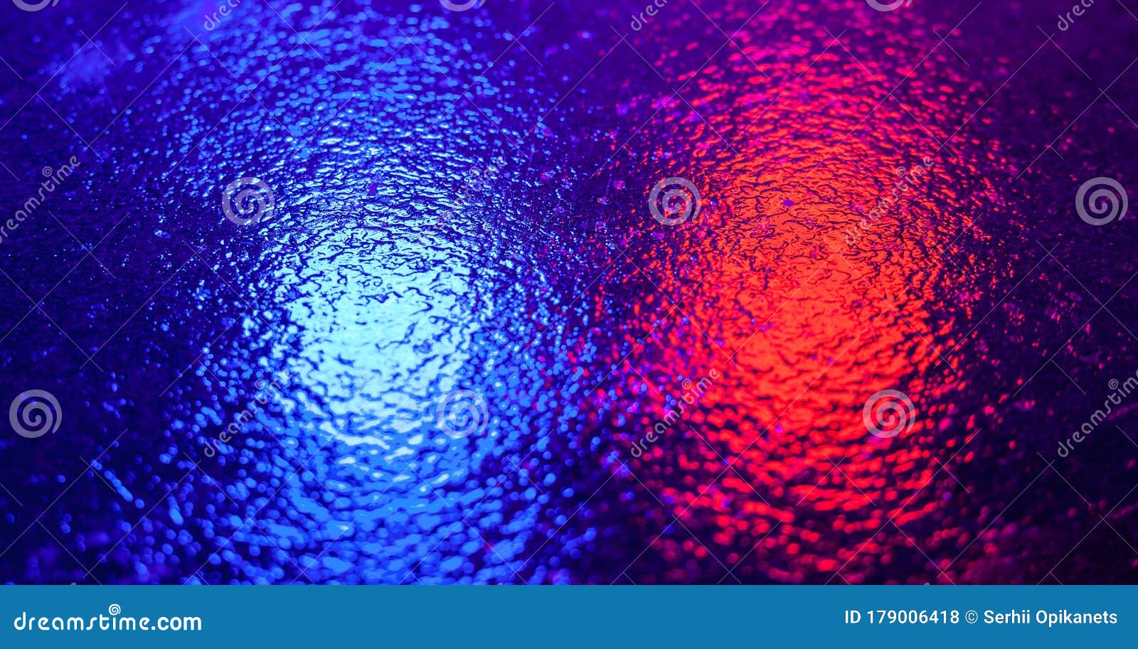 Abstract Photo Reflection of Light on a Wet Surface. Blue-red Neon ...