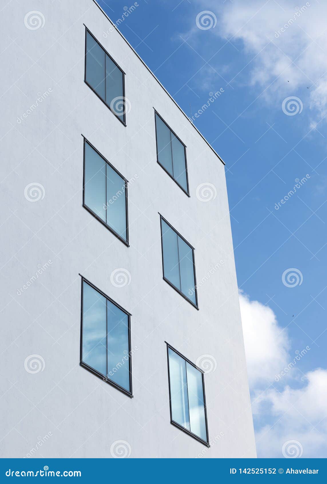 Abstract Rectangular Forms of Windows in White Wall Reflect Blue Sky ...