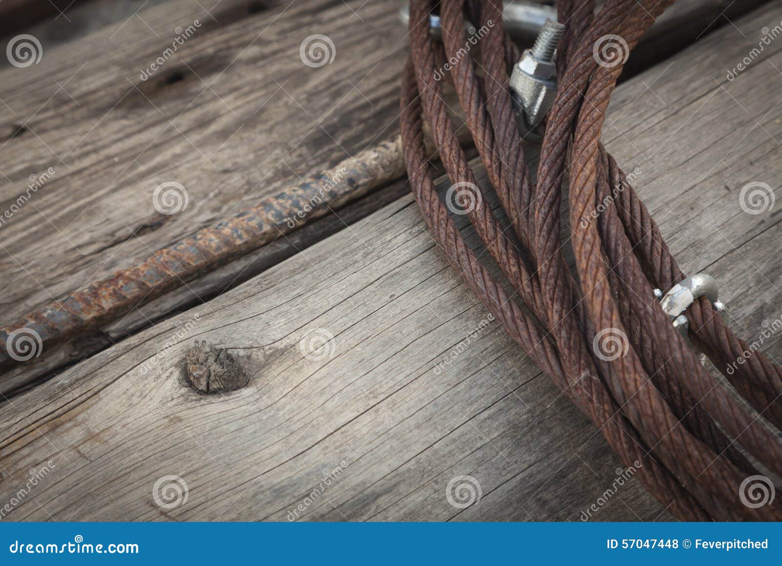 Abstract Rusty Iron Cable Laying on Old Wood Planks Stock Photo - Image ...