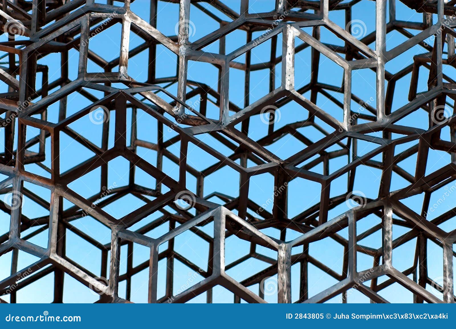 Abstract Sculpture Made Of Interlocking Shapes And Patterns, With ...