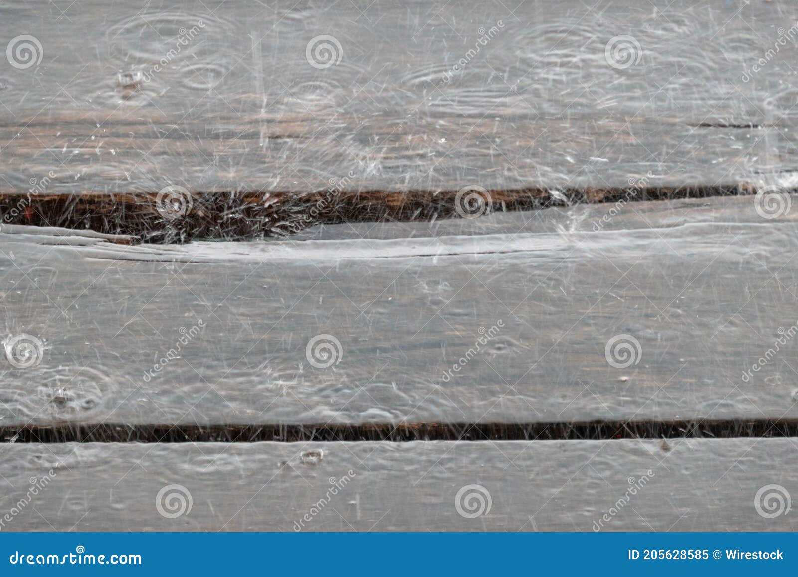 Abstract Shot of Rain Falling on a Wooden Platform Stock Image - Image ...