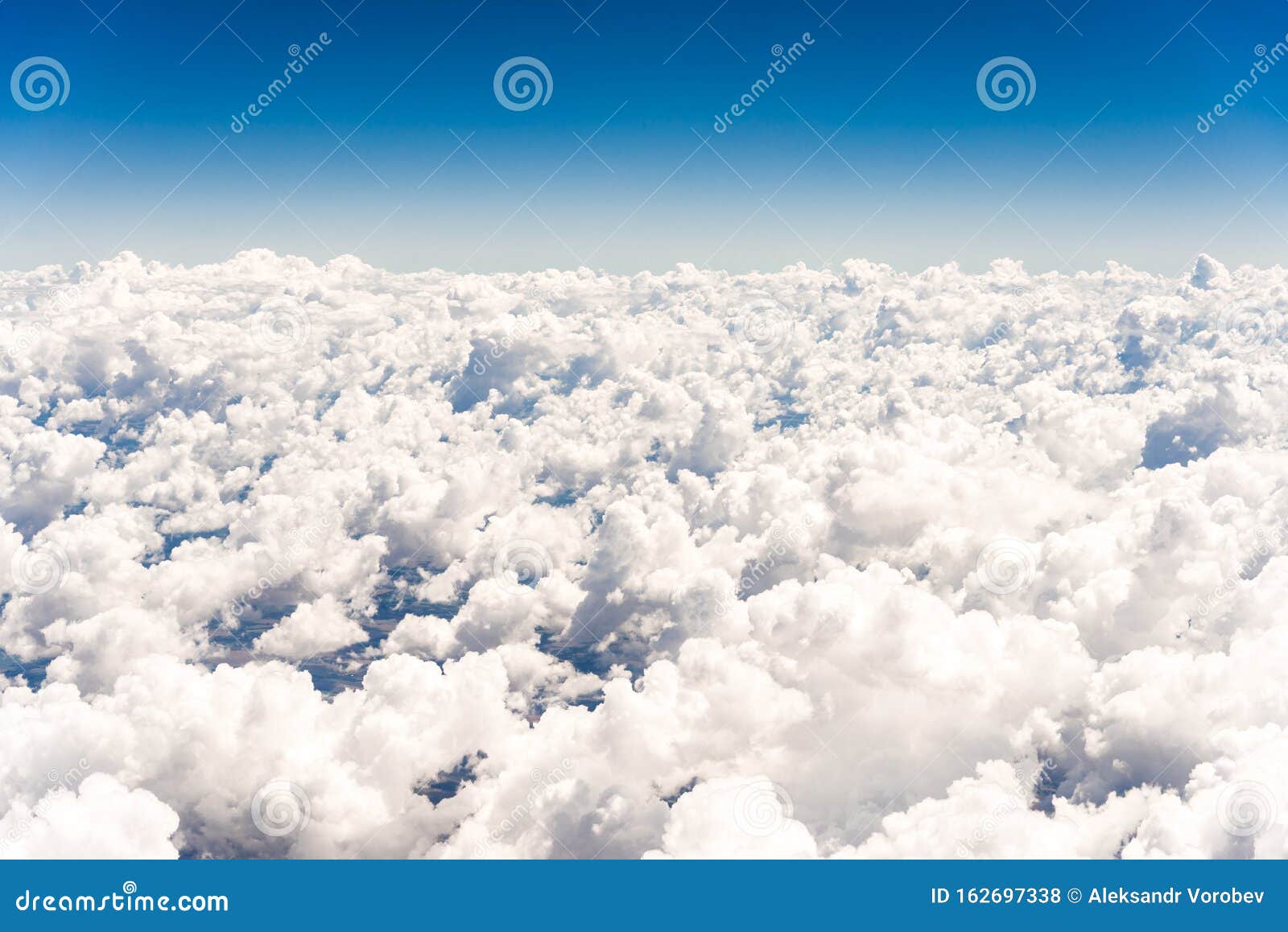 Abstract Skyscape Background with White Cumulus Clouds Against Blue Sky ...