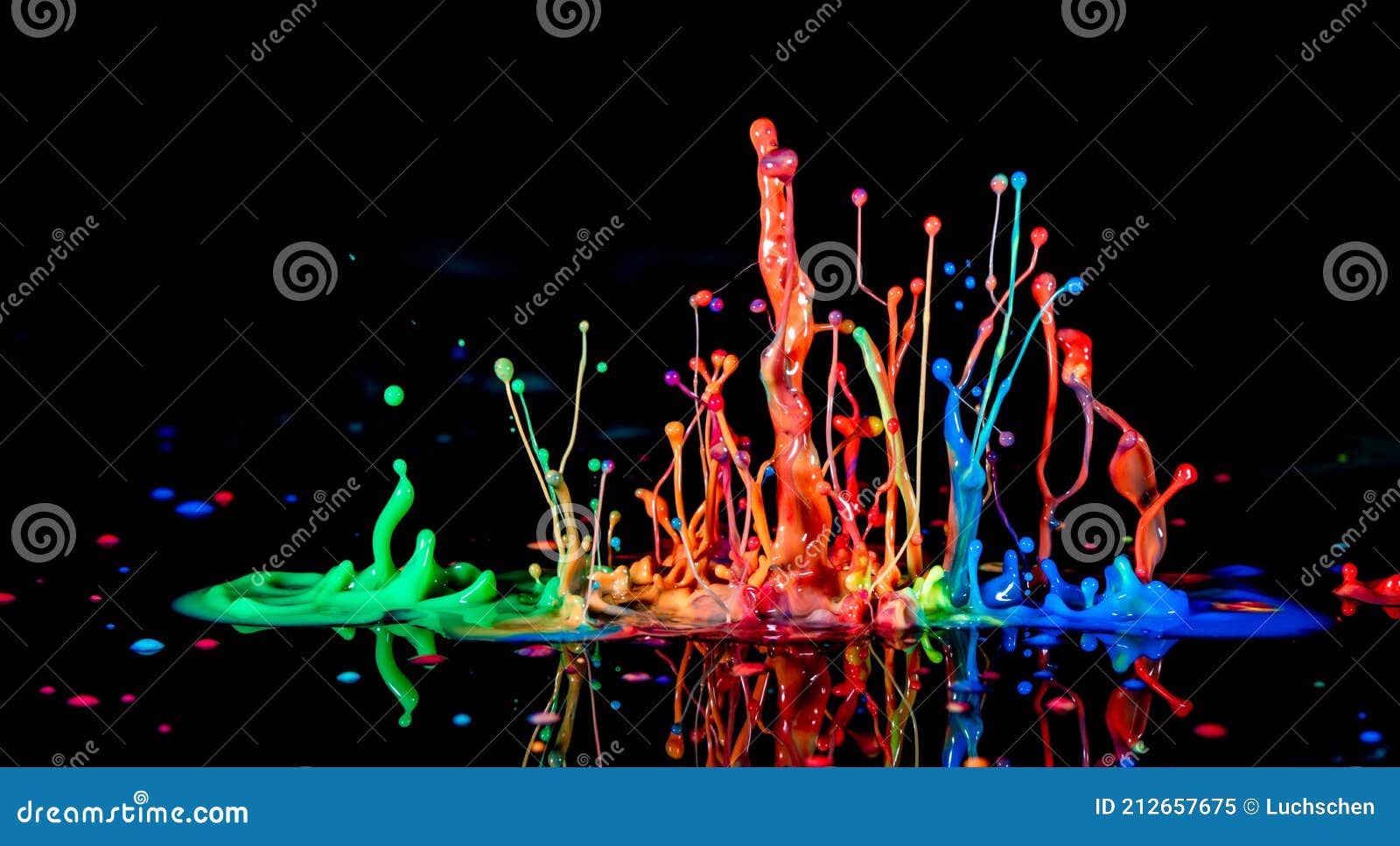 Abstract Splash of Color Ink on Black Background Stock Image - Image of ...