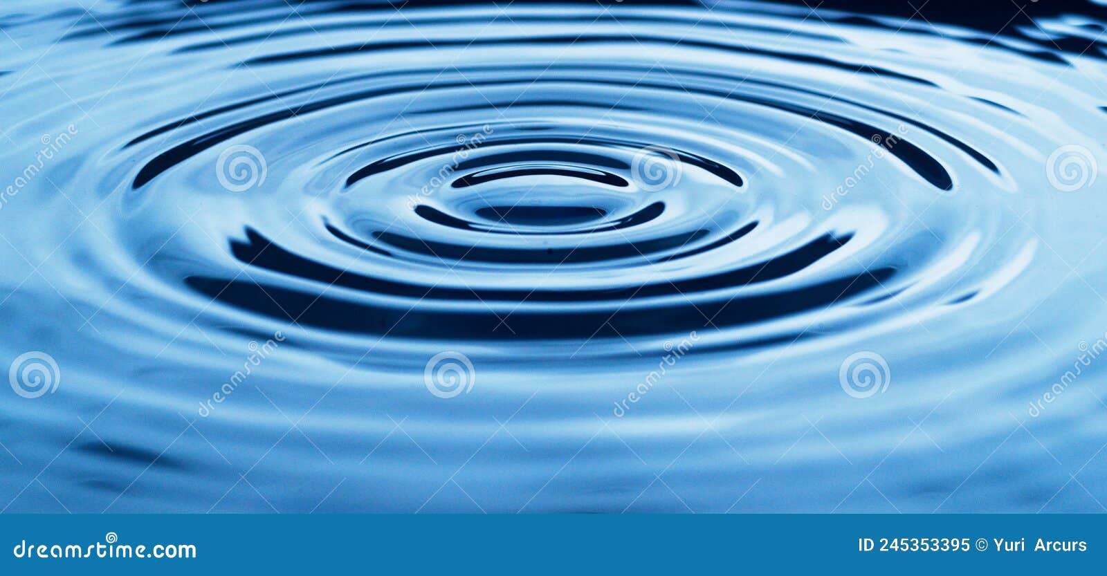 The Ripple Affect. Abstract Studio Shot of Ripples in a Puddle of Water ...