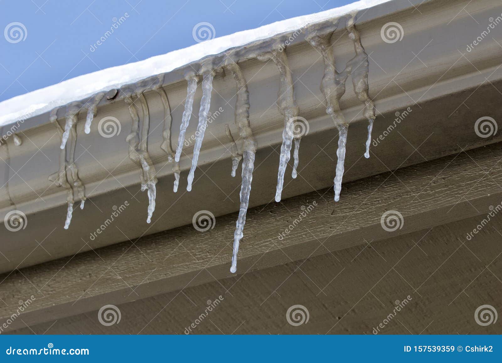 Abstract Texture of Icicles Hanging Down from a Modern Rain Gutter in ...