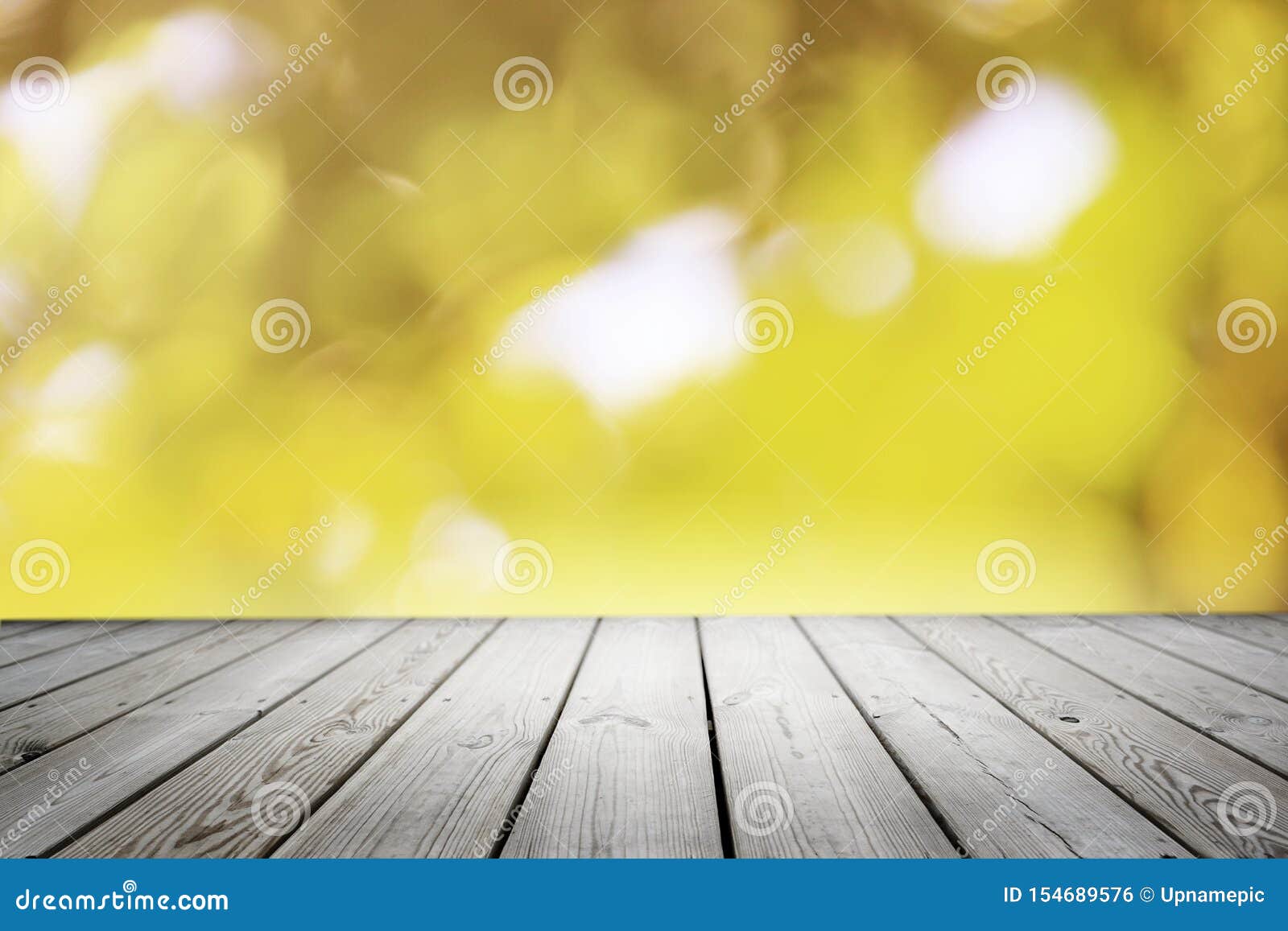 Blurred Abstract Yellow Background and Wooden Table. Stock Photo ...