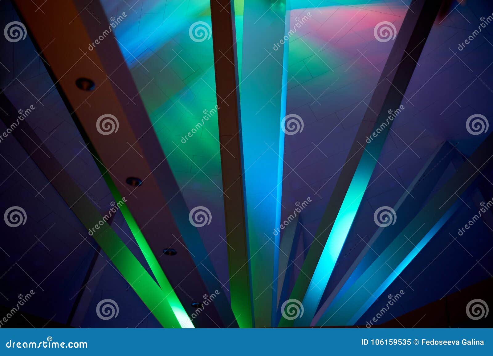 Abstraction.Beams Under Polycom with Coloured Lights. Beautiful Rich ...