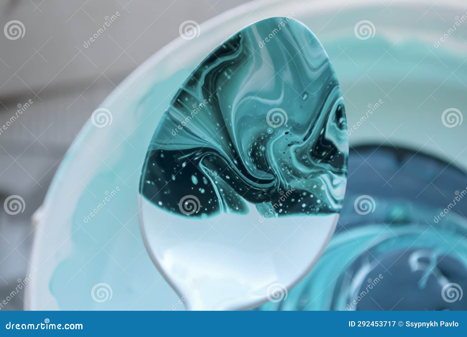 Abstraction. Turquoise Colors on a Spoon. Mixing Turquoise Paint ...