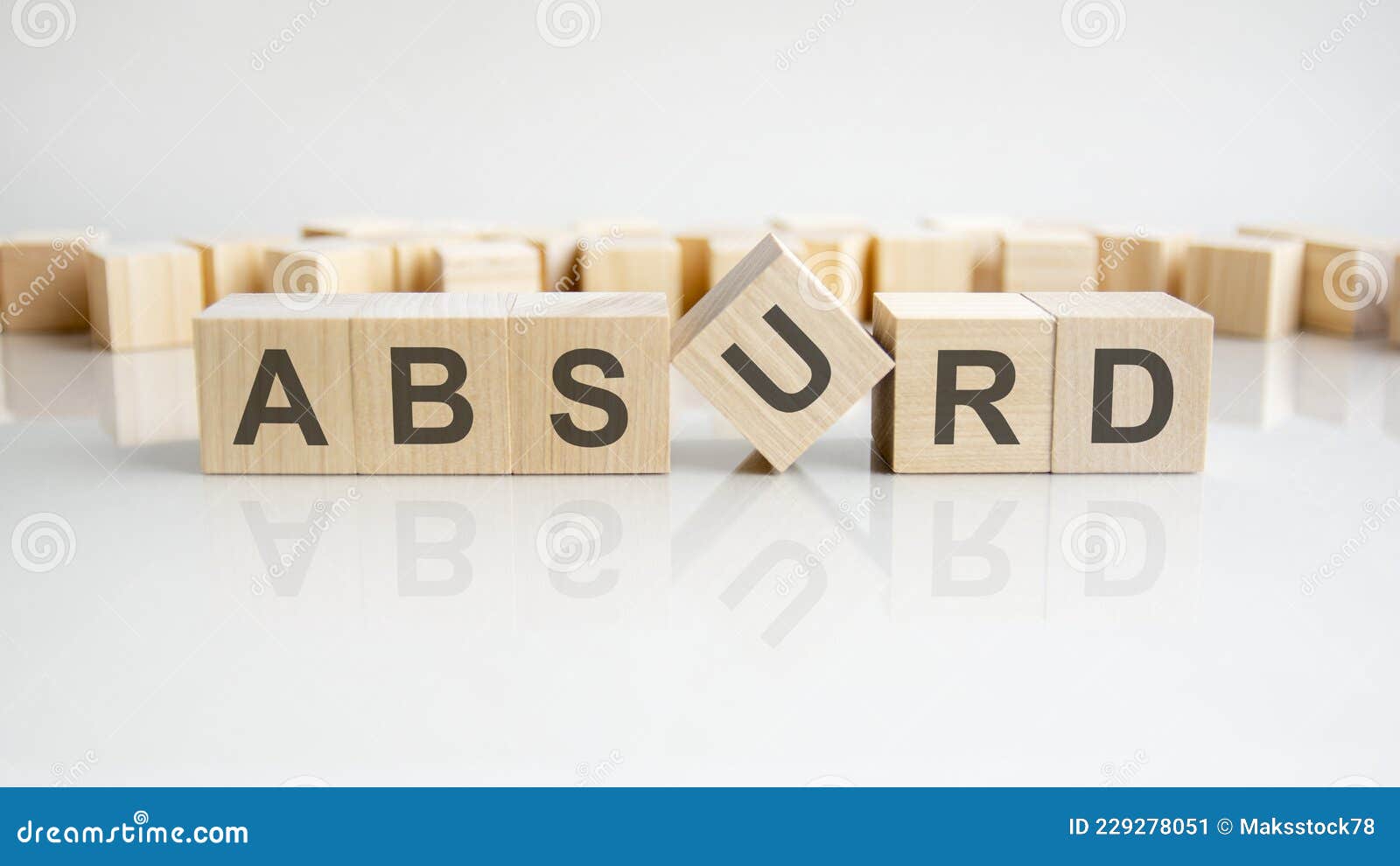 Absurd Text on a Wooden Blocks, Gray Background. Stock Image - Image of ...