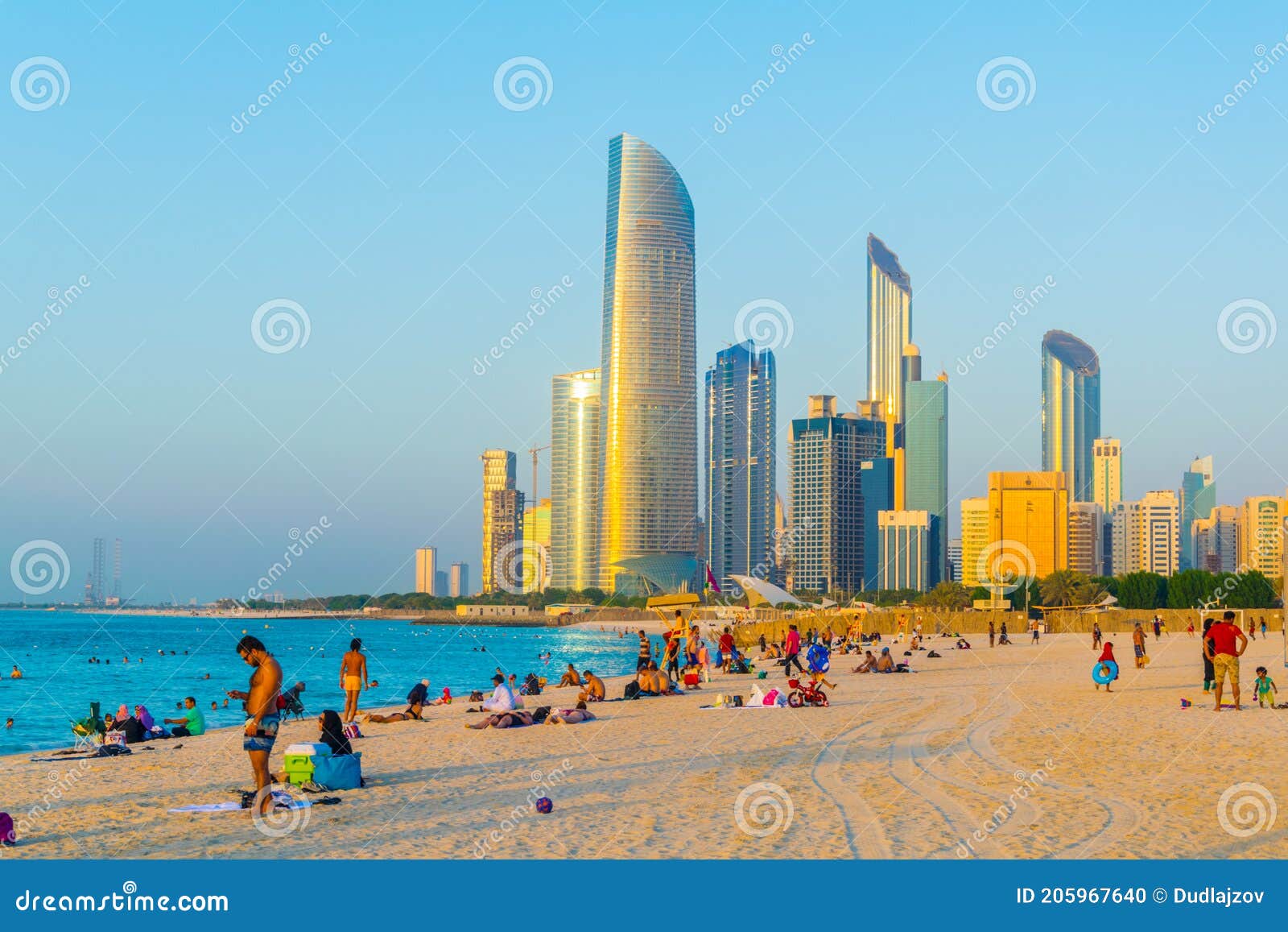 ABU DHABI, UAE, OCTOBER 27, 2016: People are Enjoying Sunset on a Beach ...