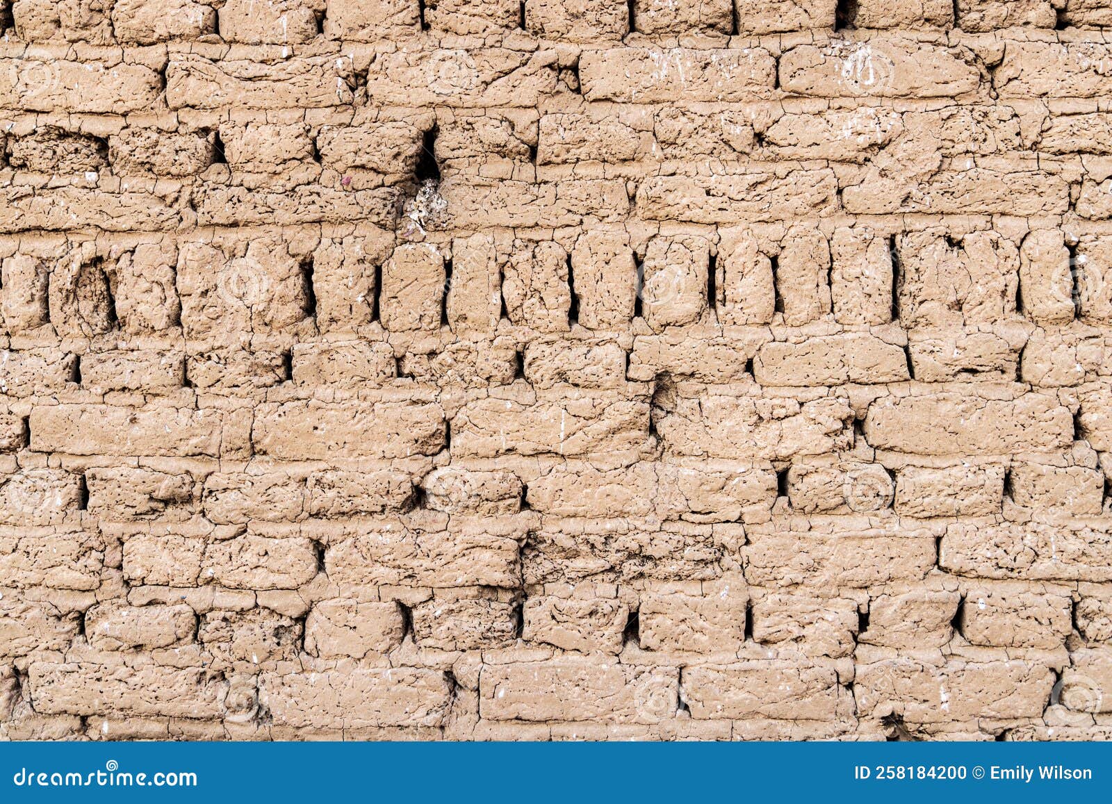 Eroded mud brick wall stock photo. Image of pattern - 258184200