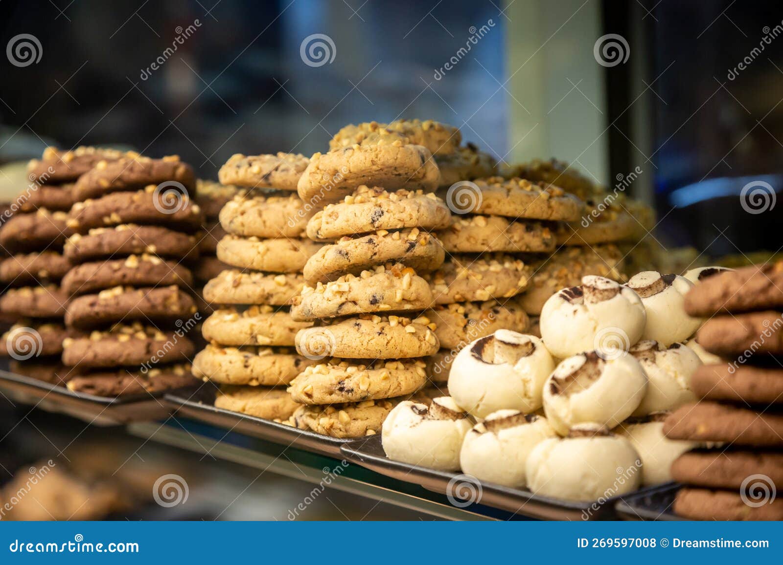 A Bakery Window Display with Piles of Biscuits for Sale Stock Photo ...