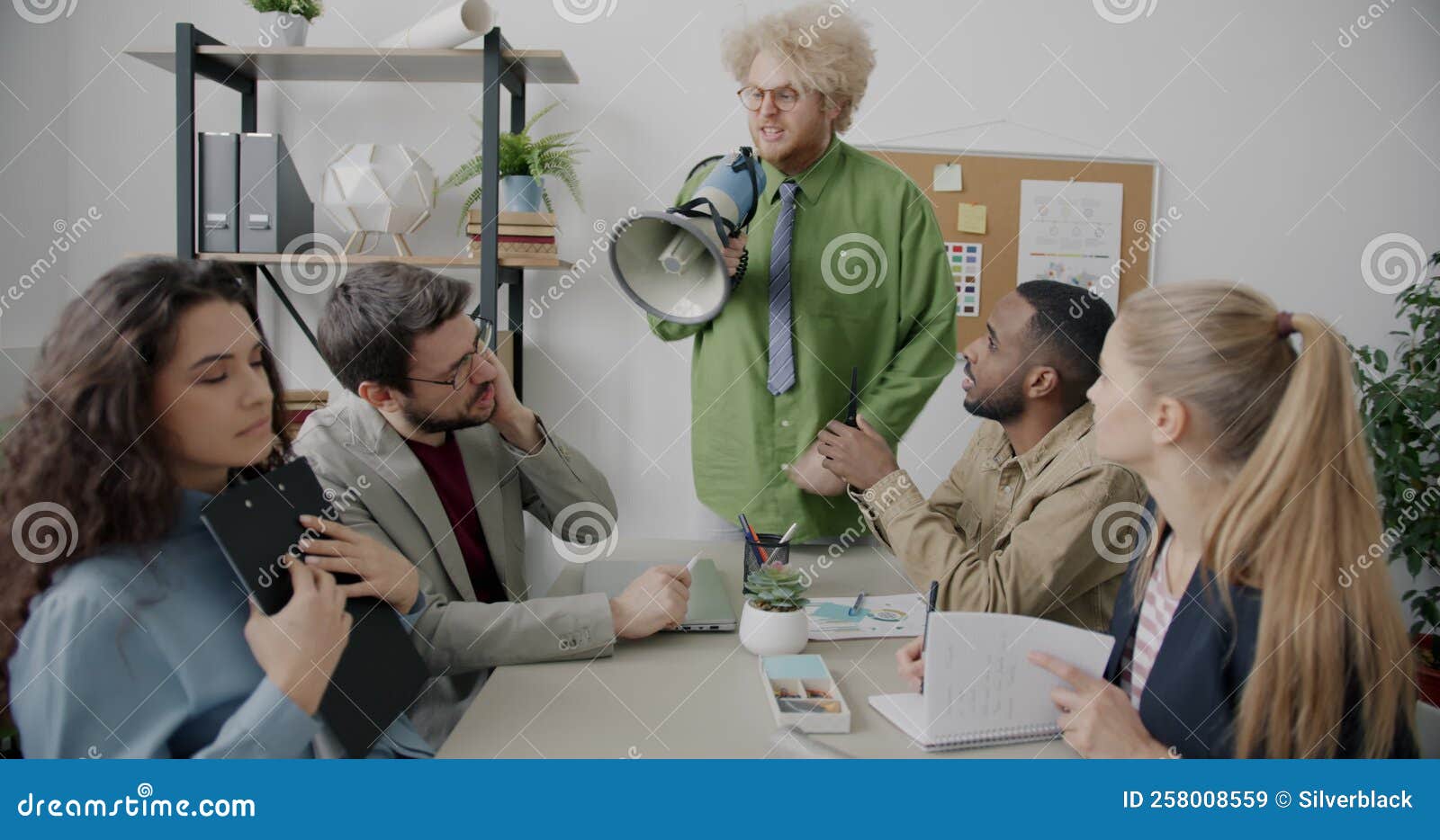Abusive Boss Yelling at Scared Employees during Meeting Using ...