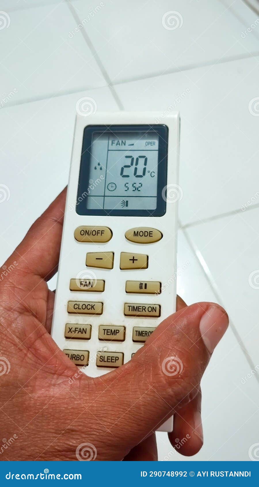 AC remote in hand stock photo. Image of held, hand, temp - 290748992
