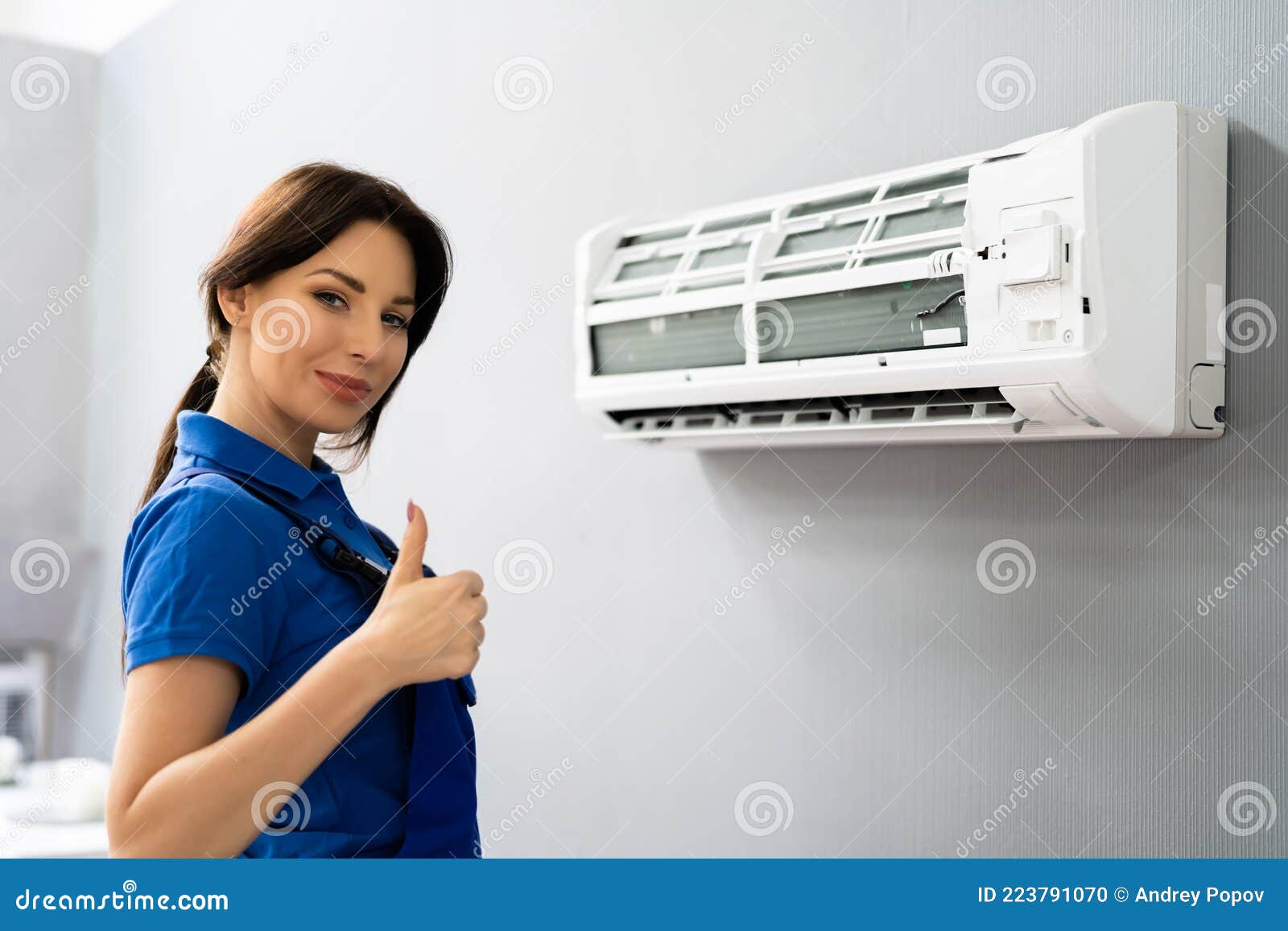 AC Repair Technician stock photo. Image of girl, condition - 223791070