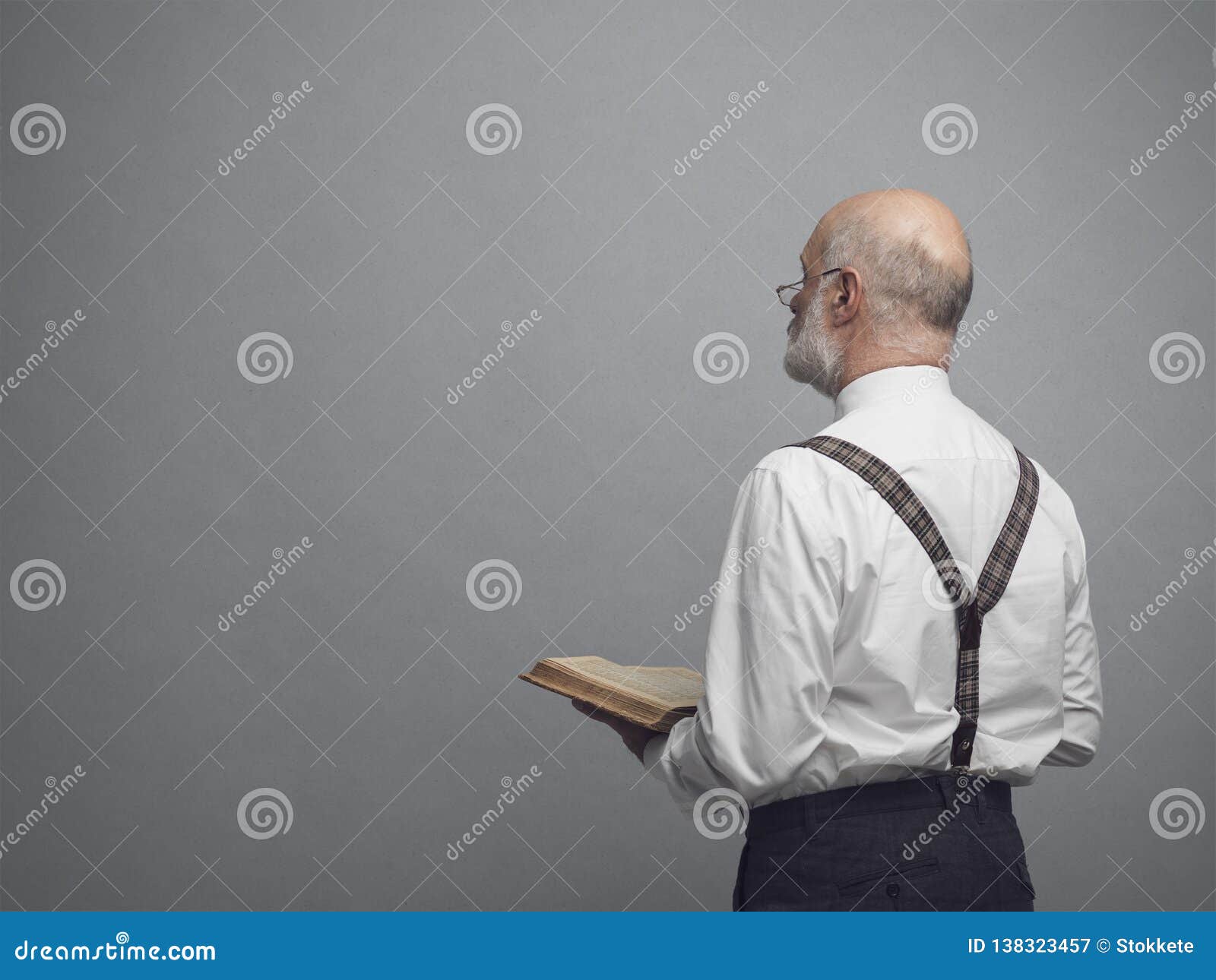 Academic Professor Teaching and Holding a Book Stock Image - Image of ...