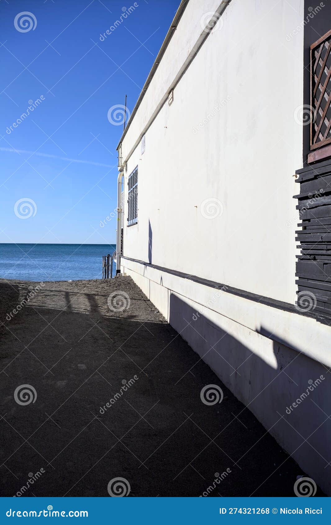 Access between Buildings To a Beach on a Sunny Day Stock Photo - Image ...