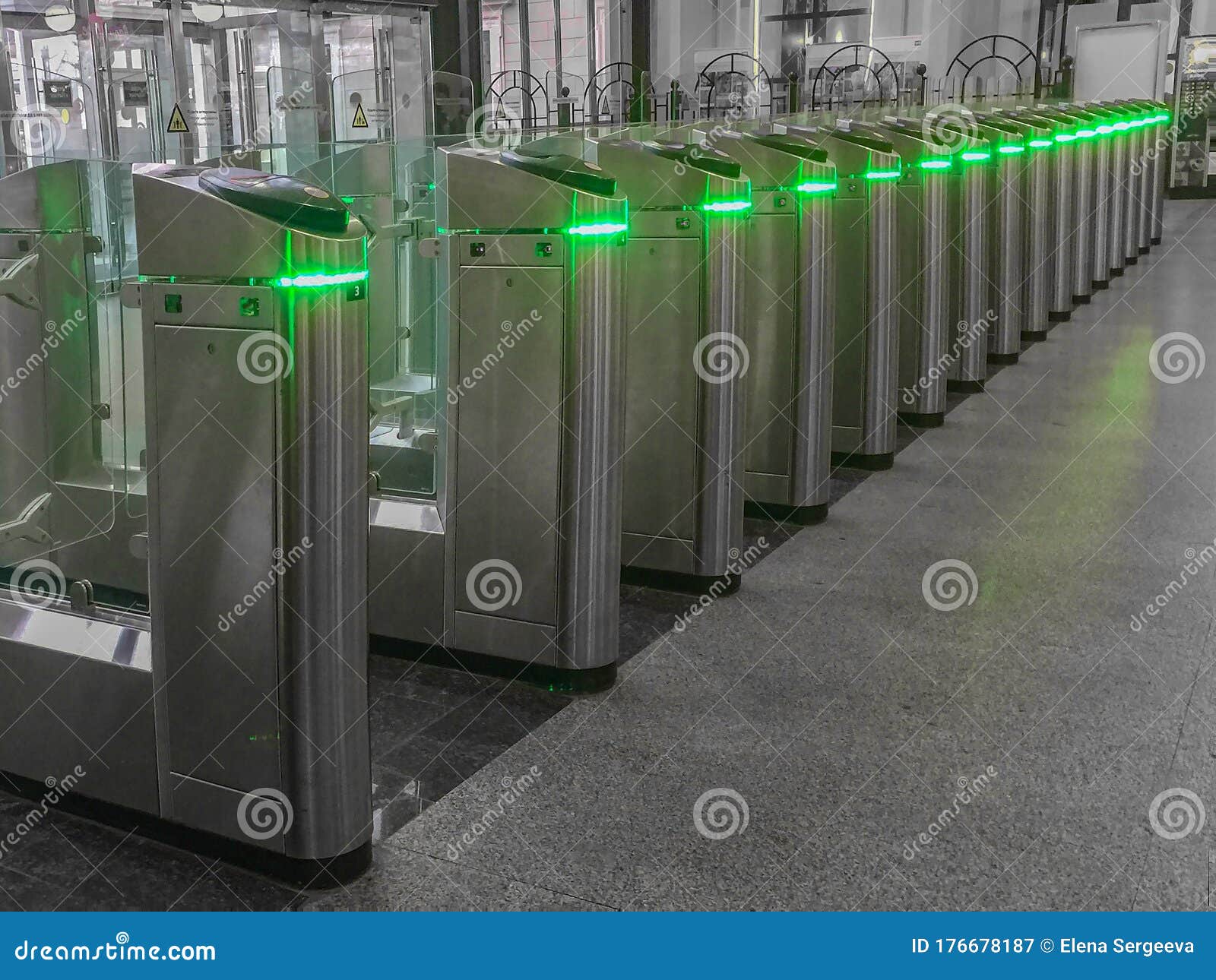 Turnstiles for Passing Passengers on Tickets at the Railway Station ...