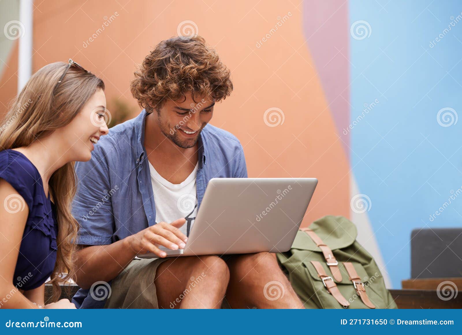 Accessing Their Online Course Work. Two College Students Sitting ...