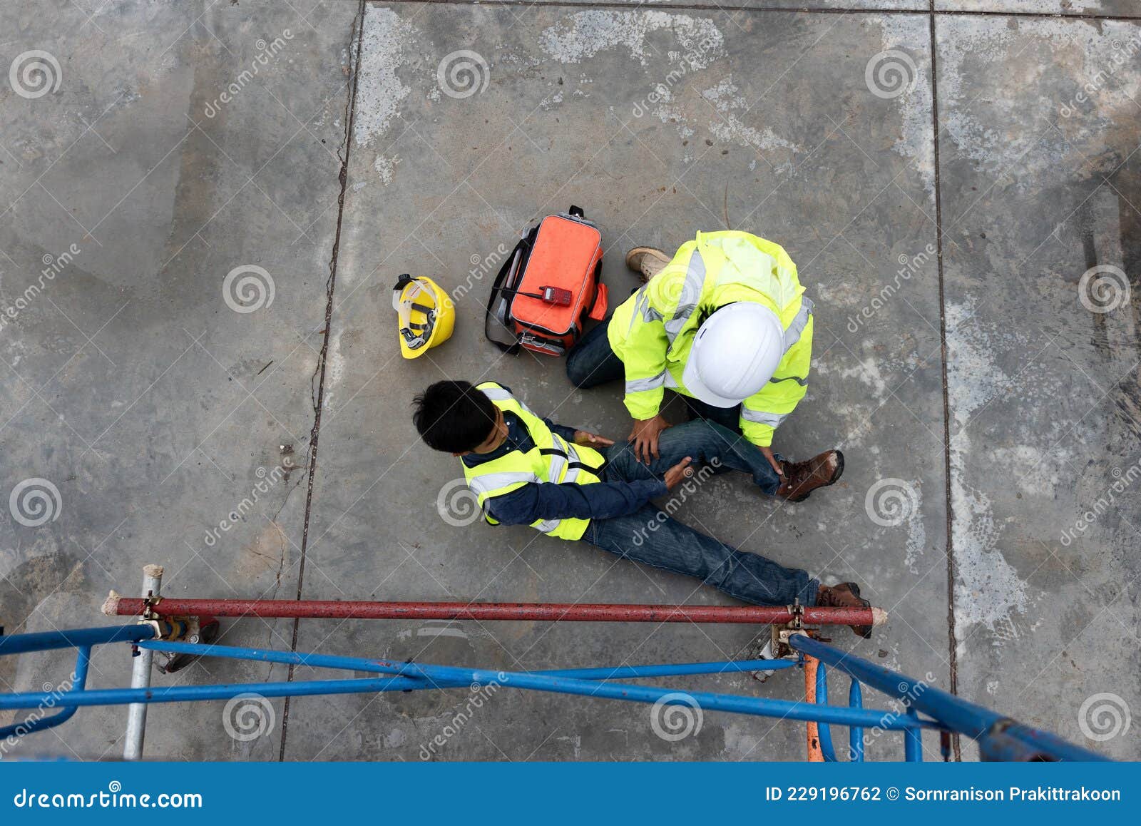 Accident in Industrial Work with First Aid Stock Photo - Image of ...