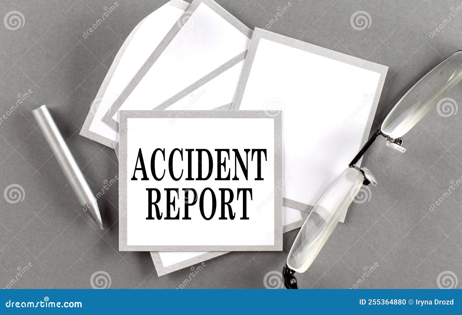 ACCIDENT REPORT Text Written on a Sticky with Pencil and Glasses Stock ...