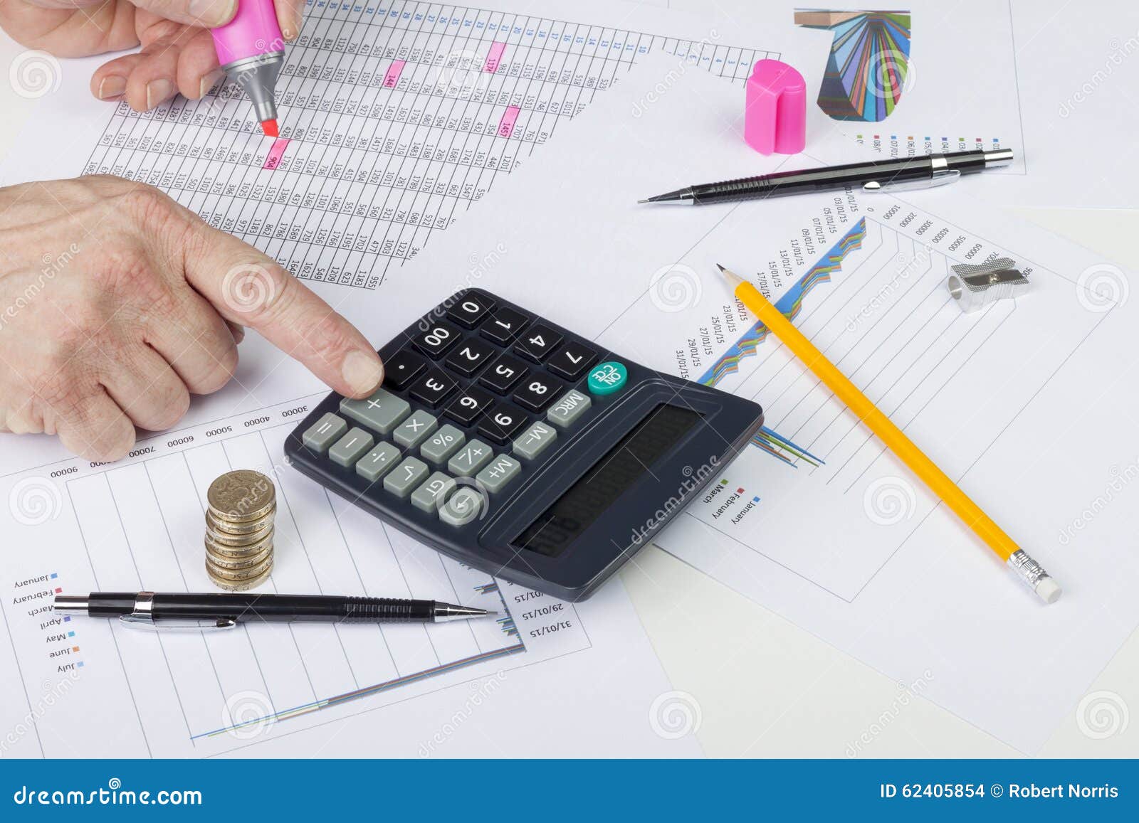 Accountant Balancing a Sales Ledger with a Calculator Stock Photo ...