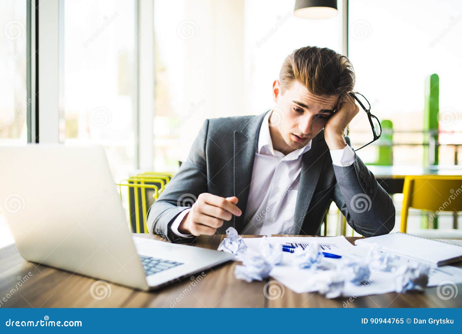 Accountant Businessman At His Desk In The Office Shows A Finger On A ...
