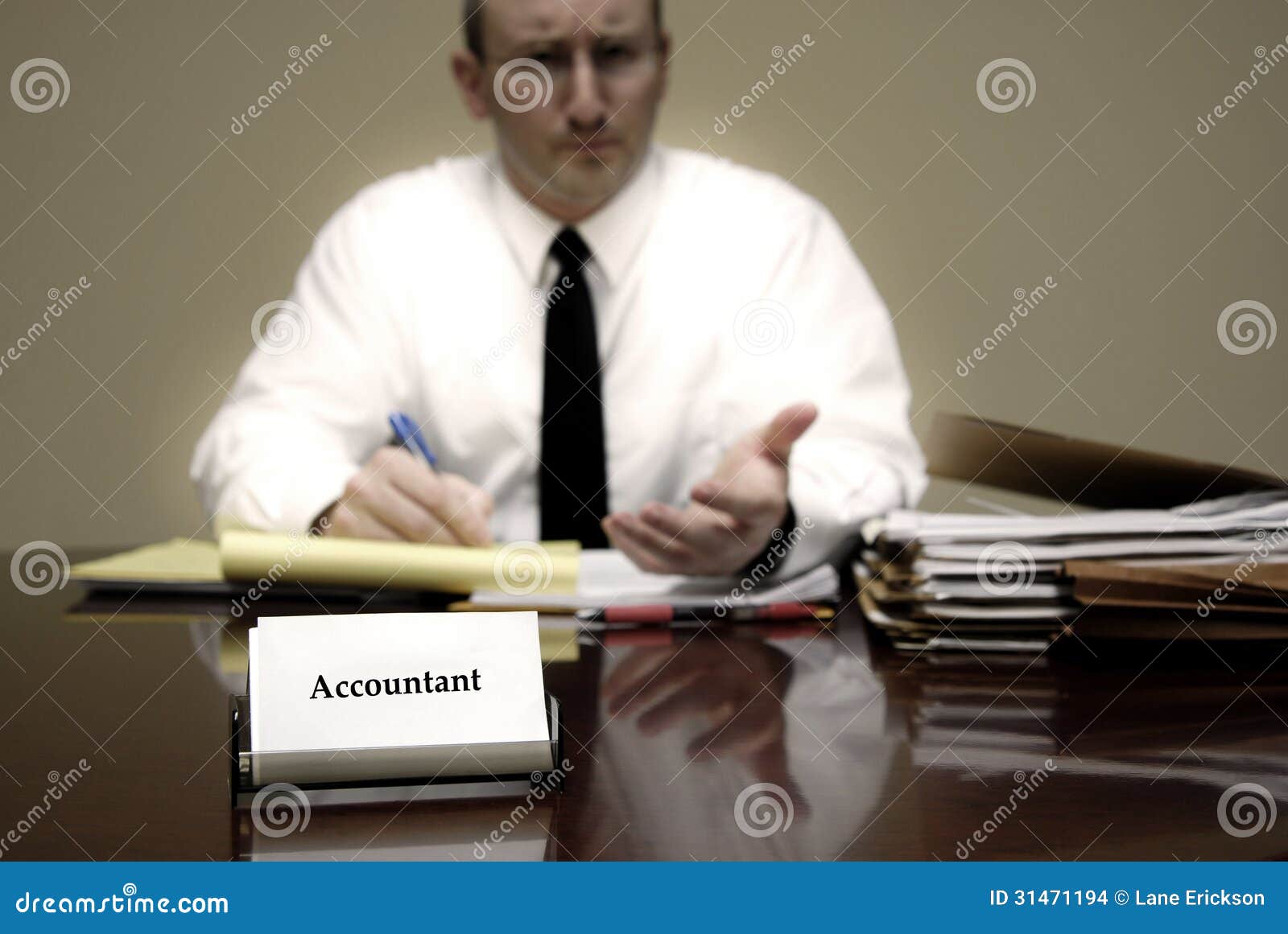 Accountant at Desk stock photo. Image of holding, accountant - 31471194