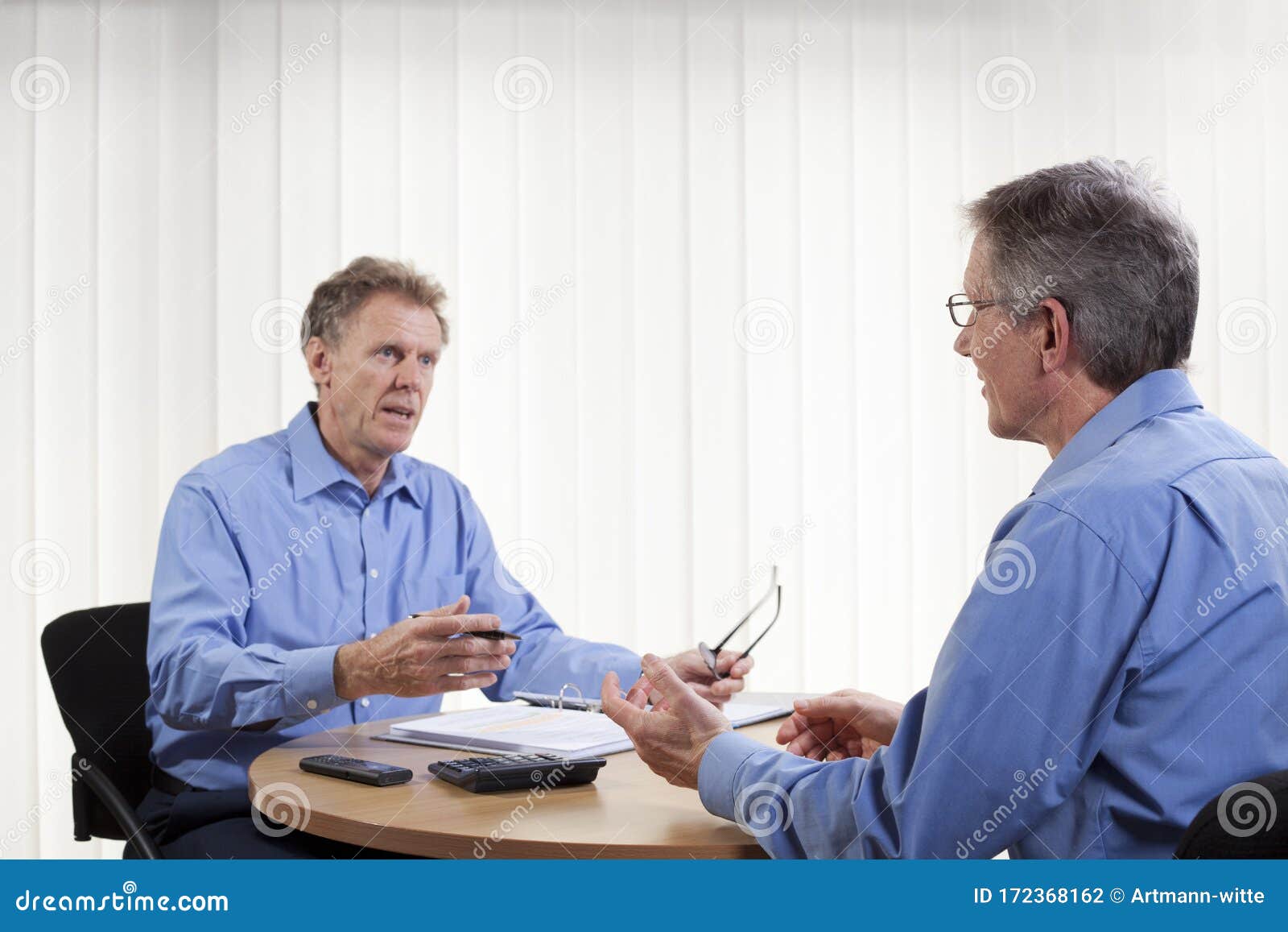 Accountant Discussing with a Client in an Office Stock Photo - Image of ...