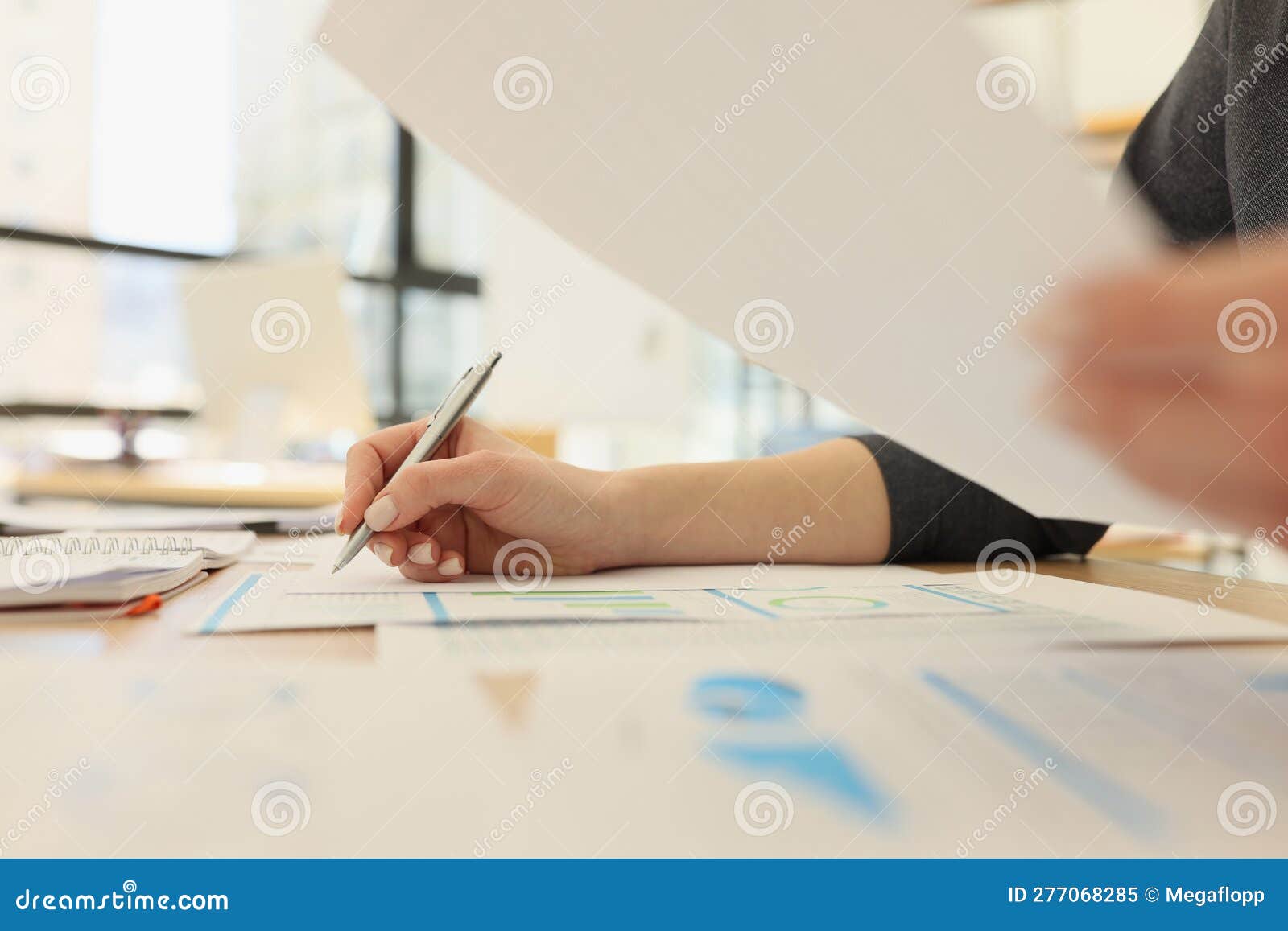 Accountant Examines Reports with Diagrams and Statistics Stock Image ...