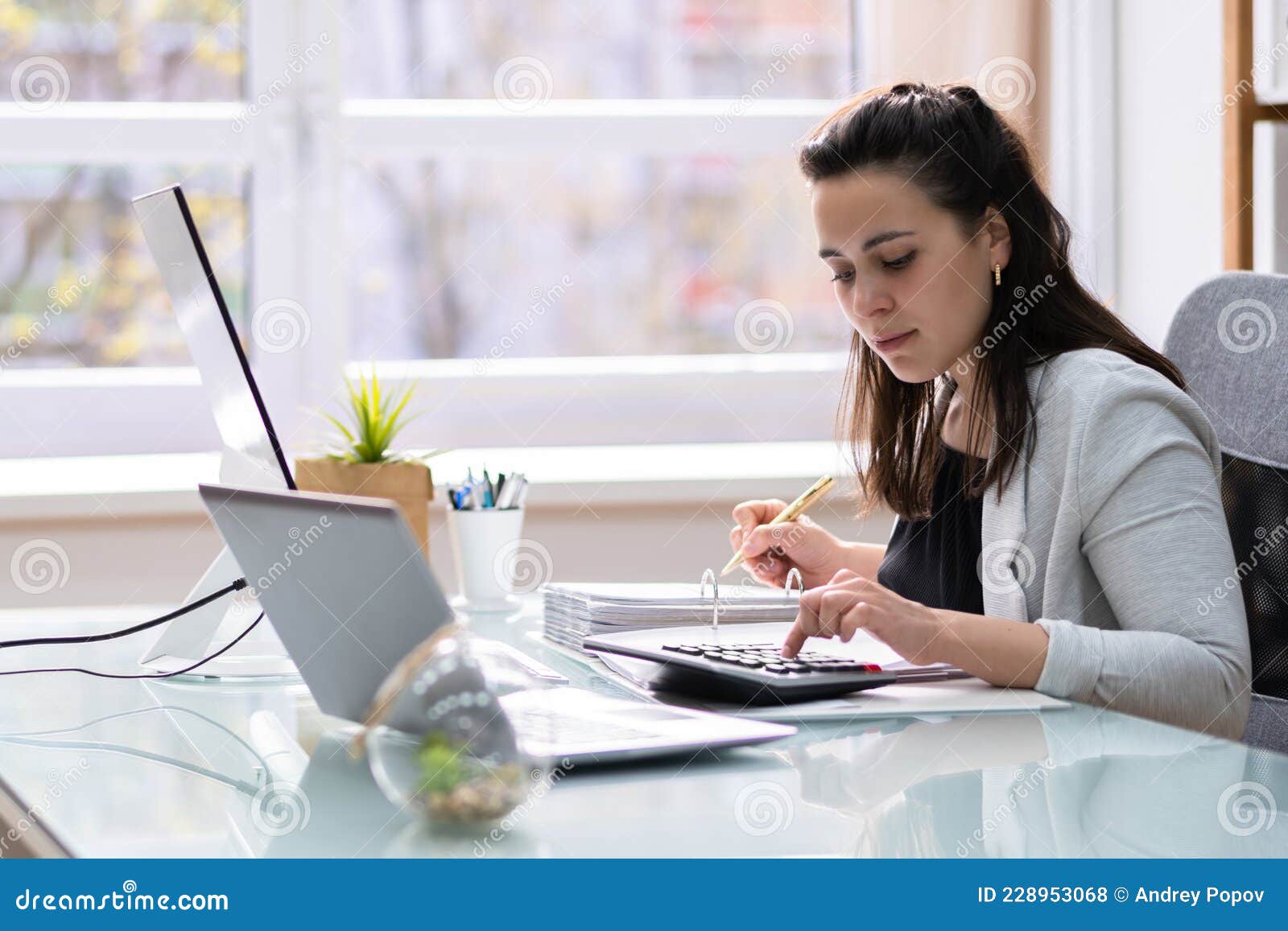 Accountant Lady in Office Using Calculator Stock Photo - Image of bill ...